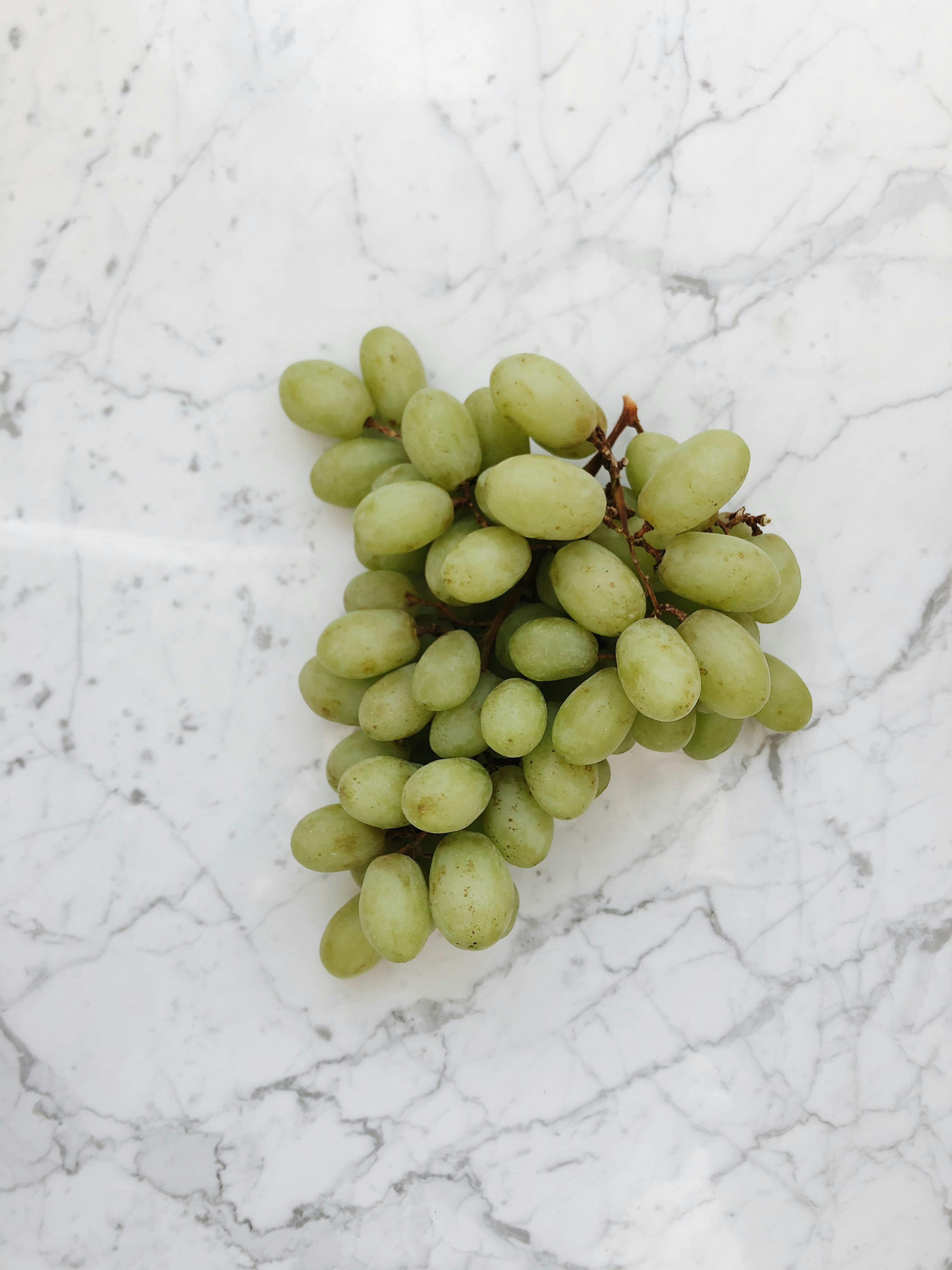 Green Grapes on Marble Table · Free Stock Photo