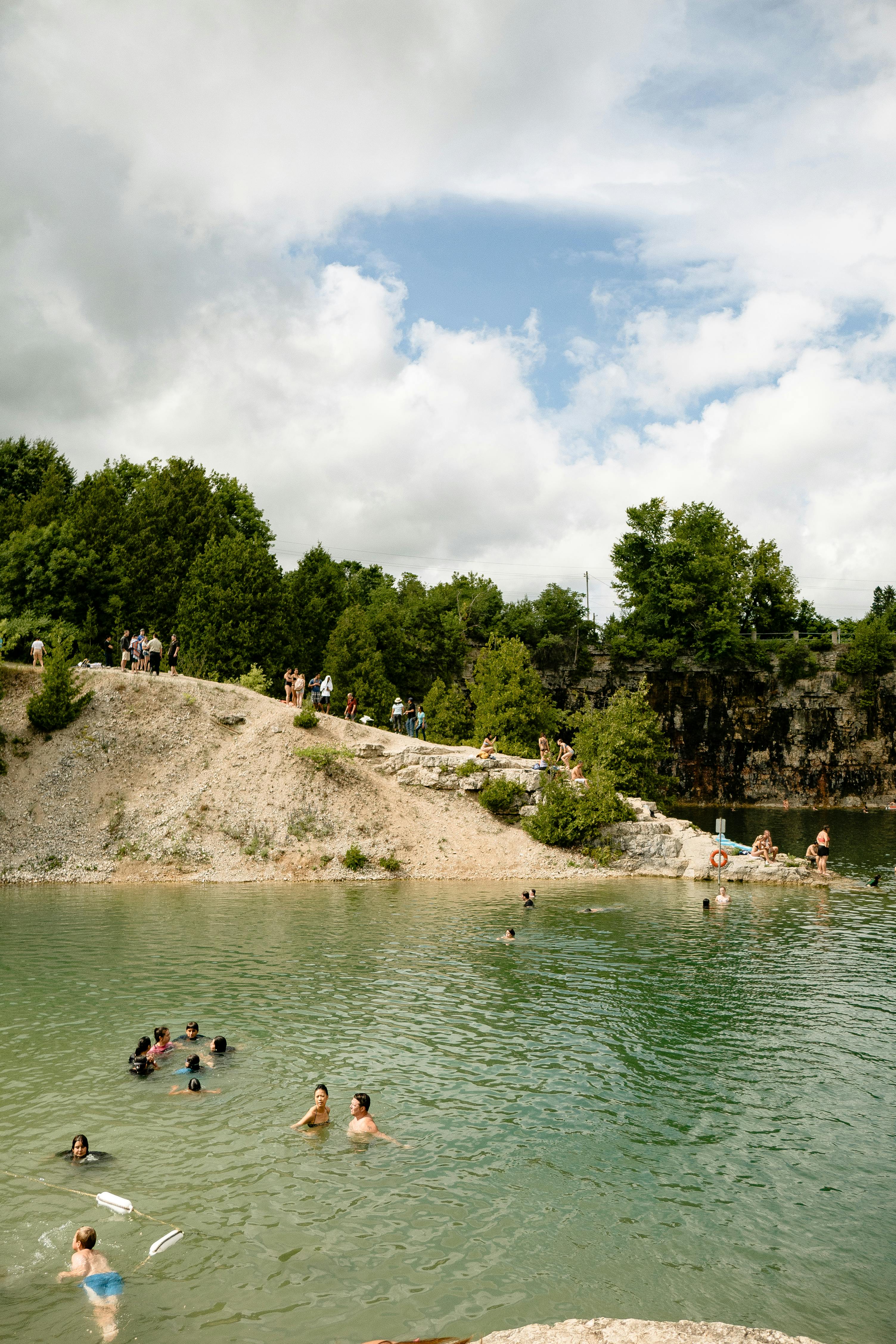 People Swimming on Lake · Free Stock Photo