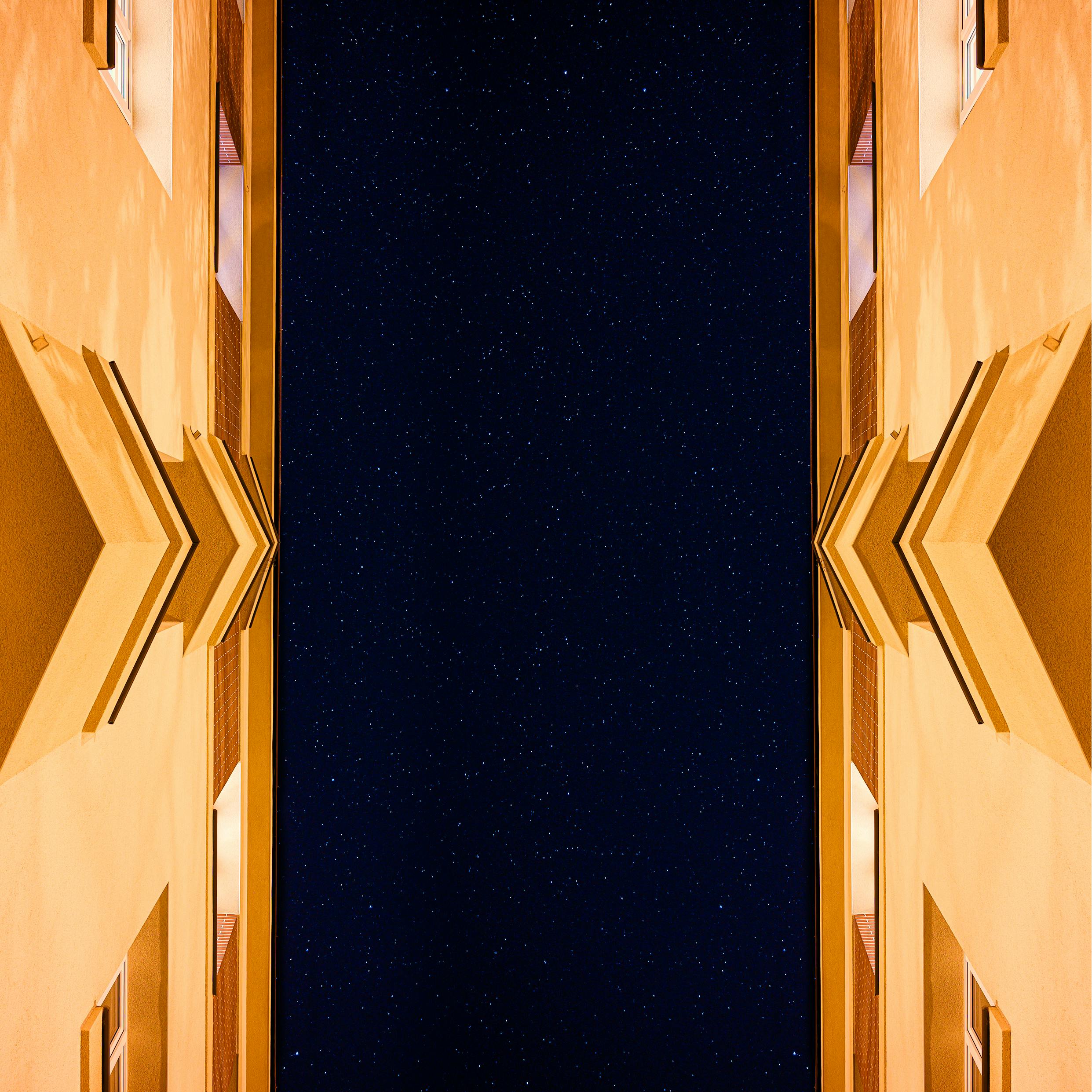 Starry Sky Over Buildings · Free Stock Photo