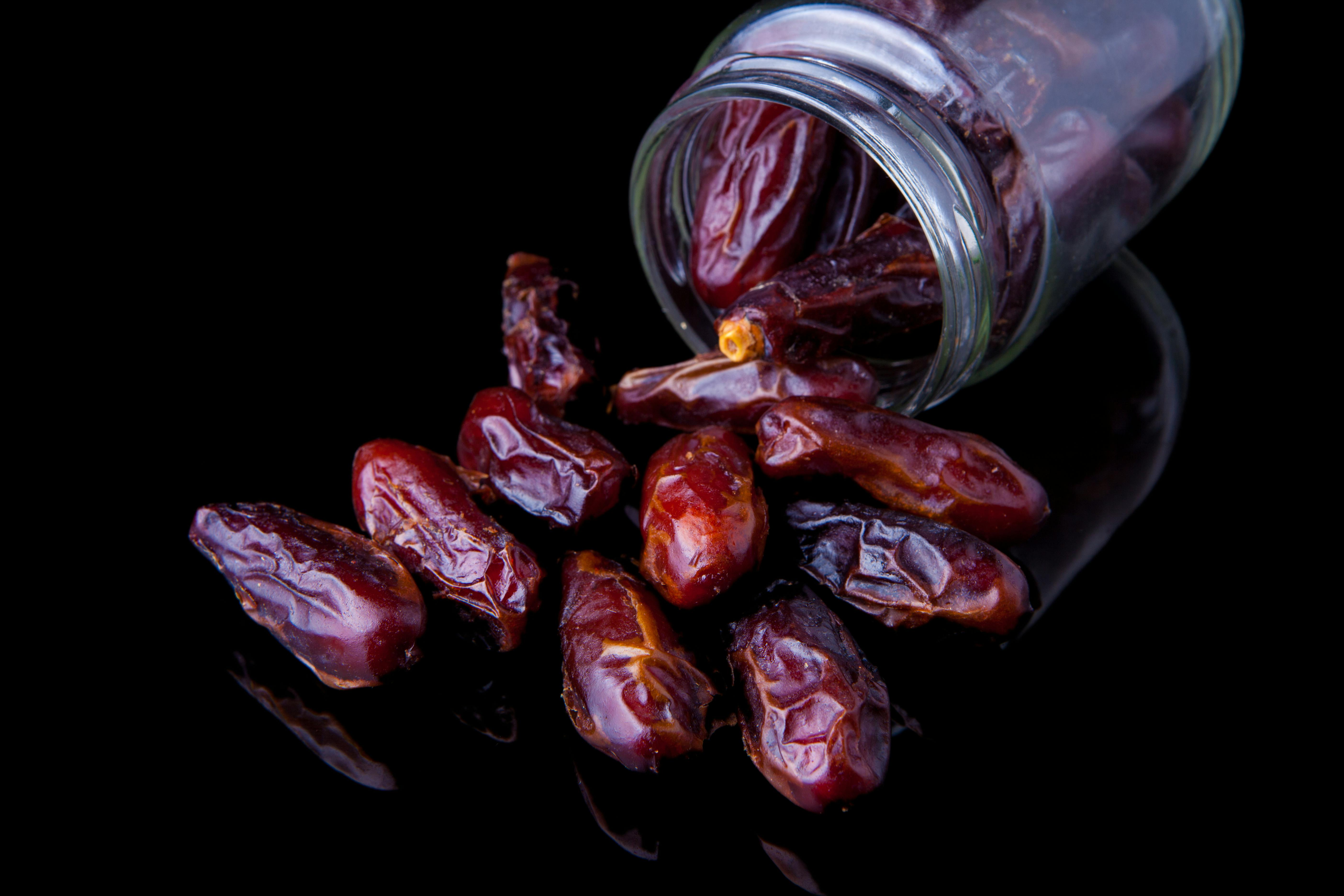 Dates in Clear Glass Jar · Free Stock Photo