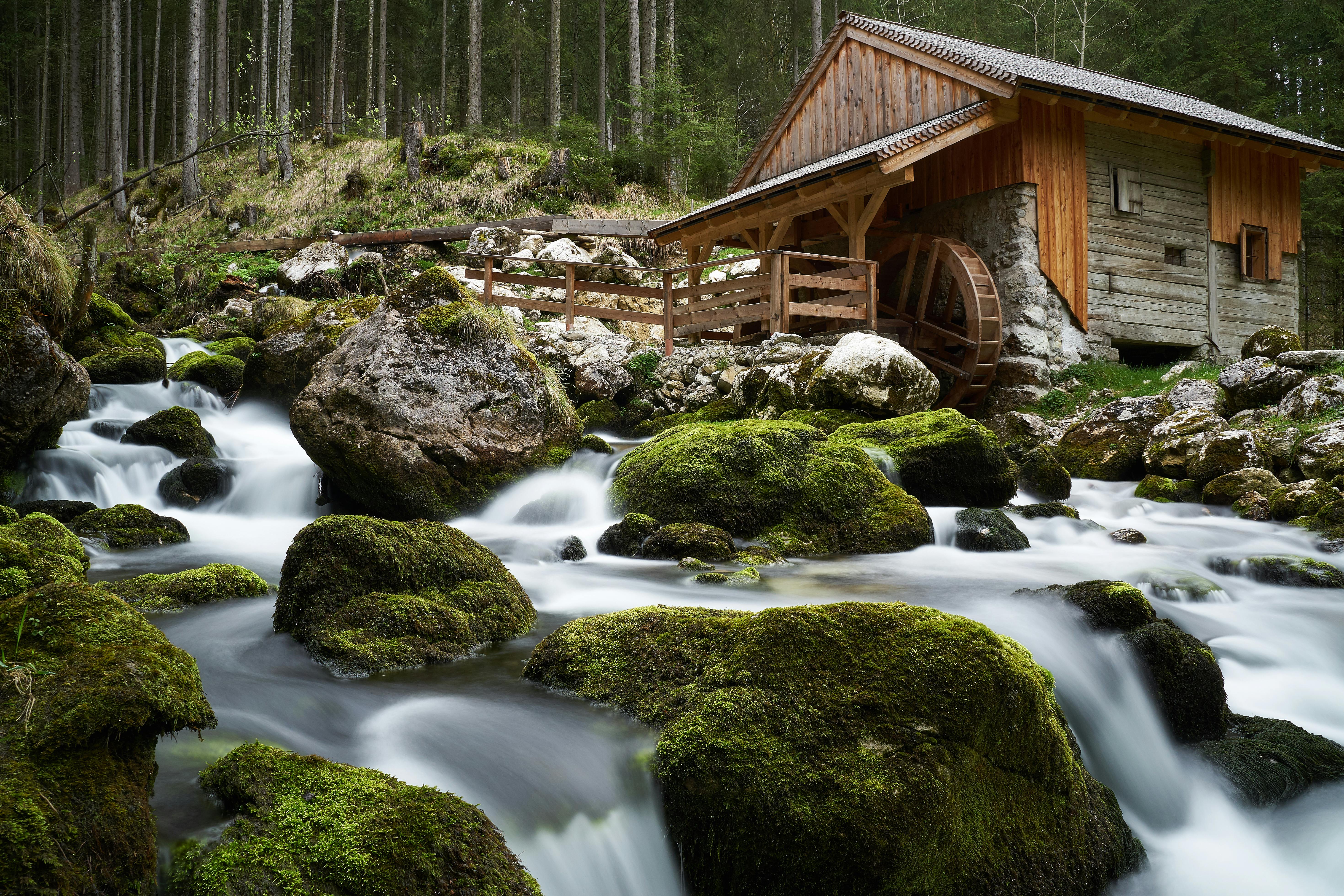 Brown Wooden House Near River · Free Stock Photo