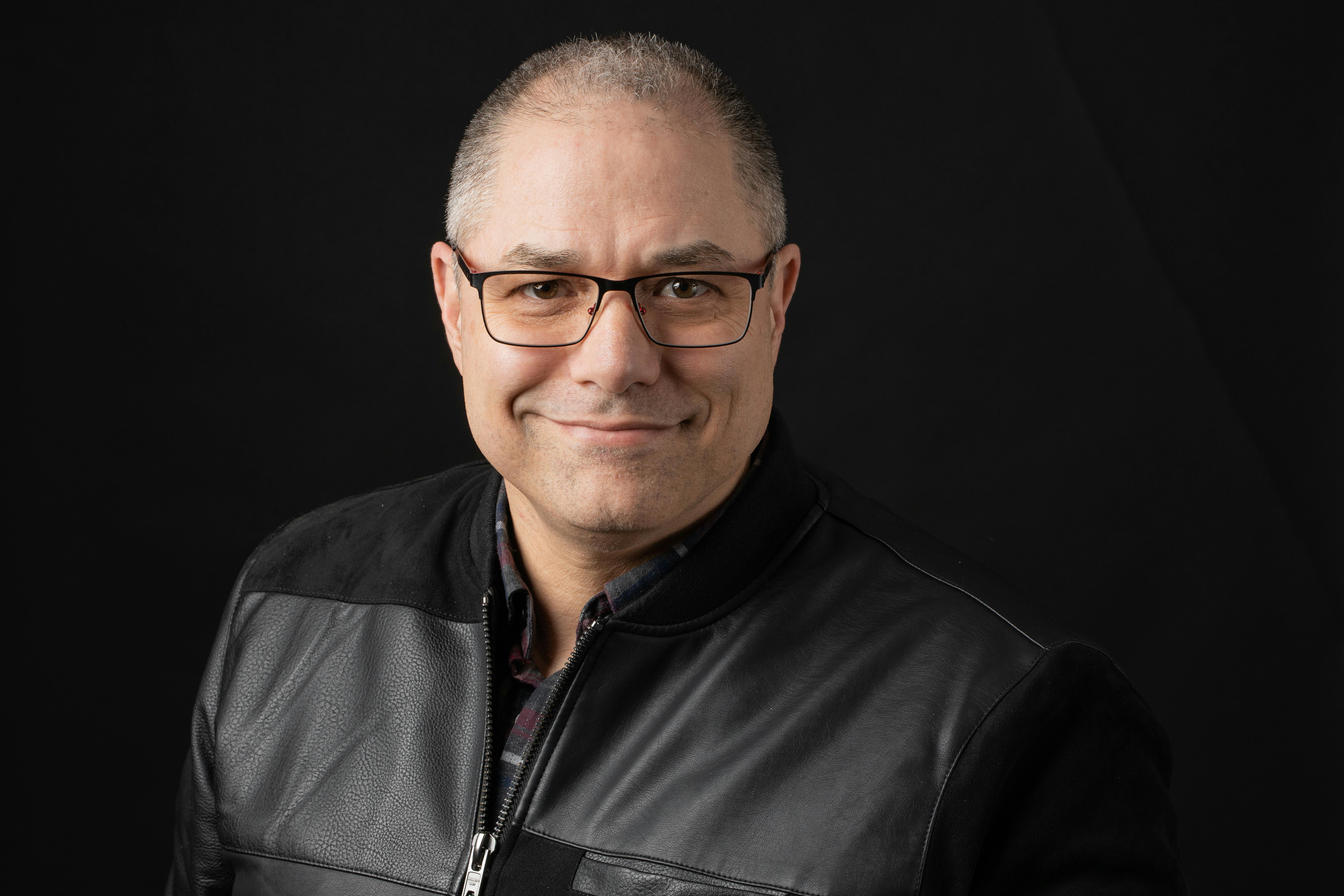 Photo of Laughing Man in White Dress Shirt Carrying a Tablet · Free ...