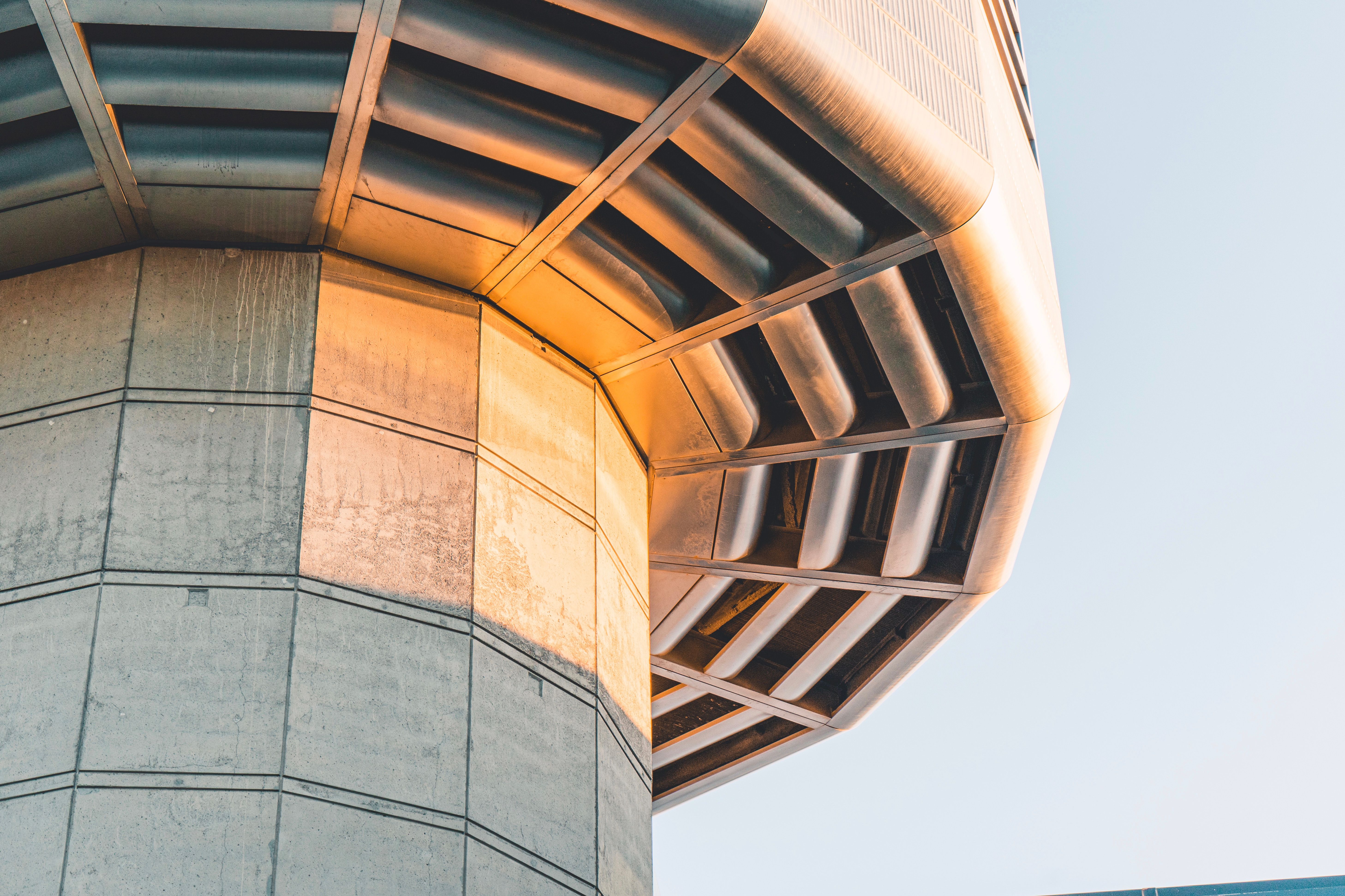 Modern building with tower on street · Free Stock Photo