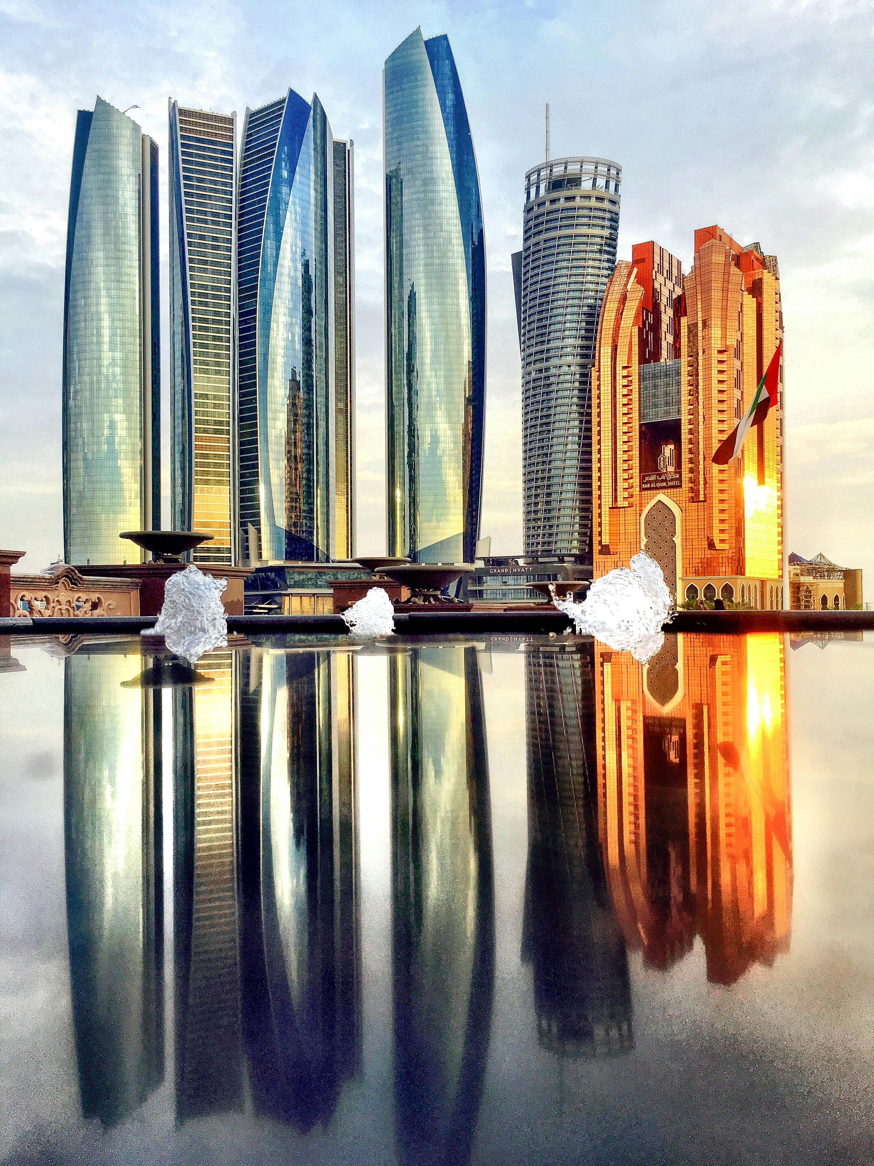 Kostenloses Foto zum Thema: abu dhabi, hohe gebäude, orange