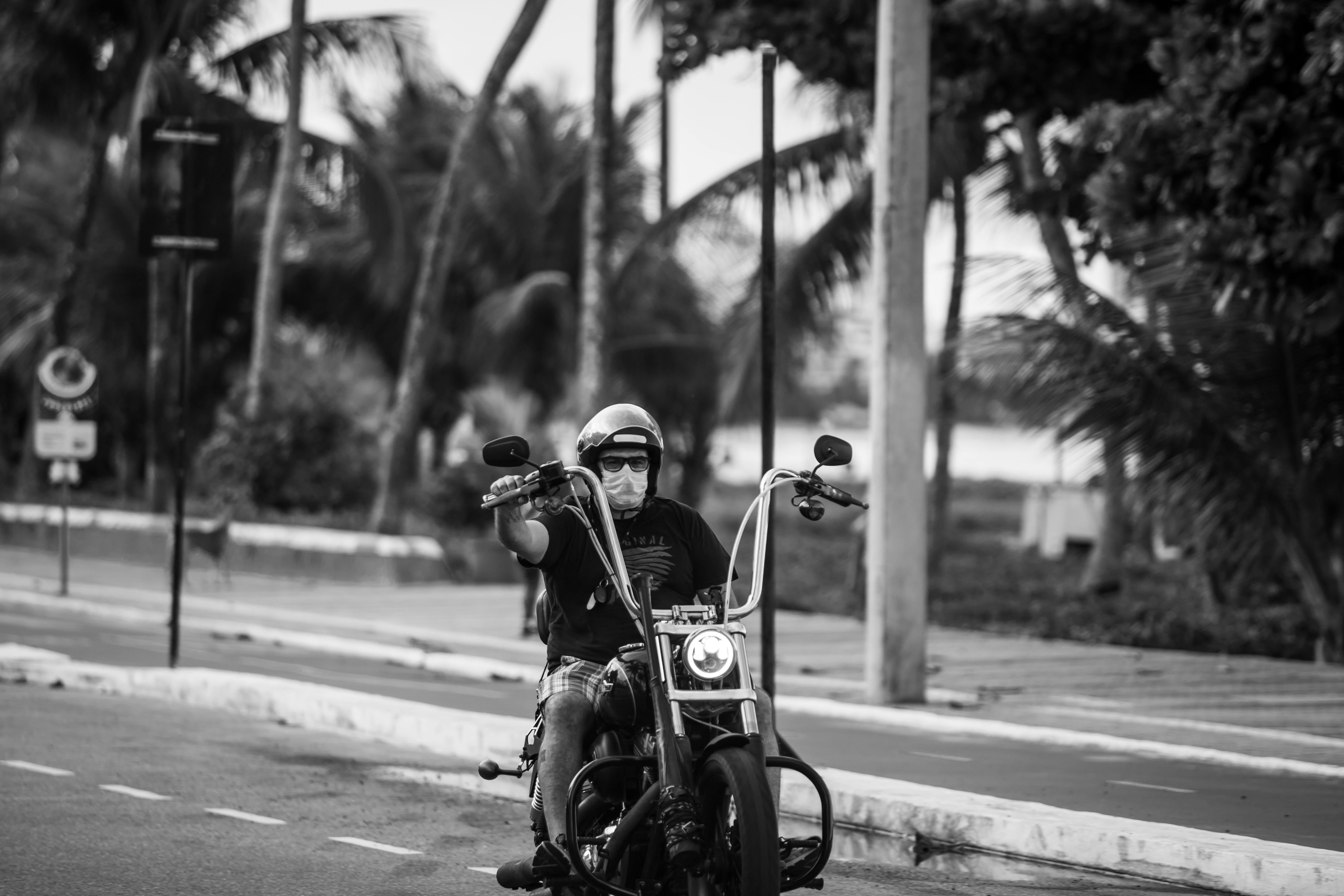 Grayscale Photo of Man Wearing Face Mask Riding on a Motorcycle · Free ...
