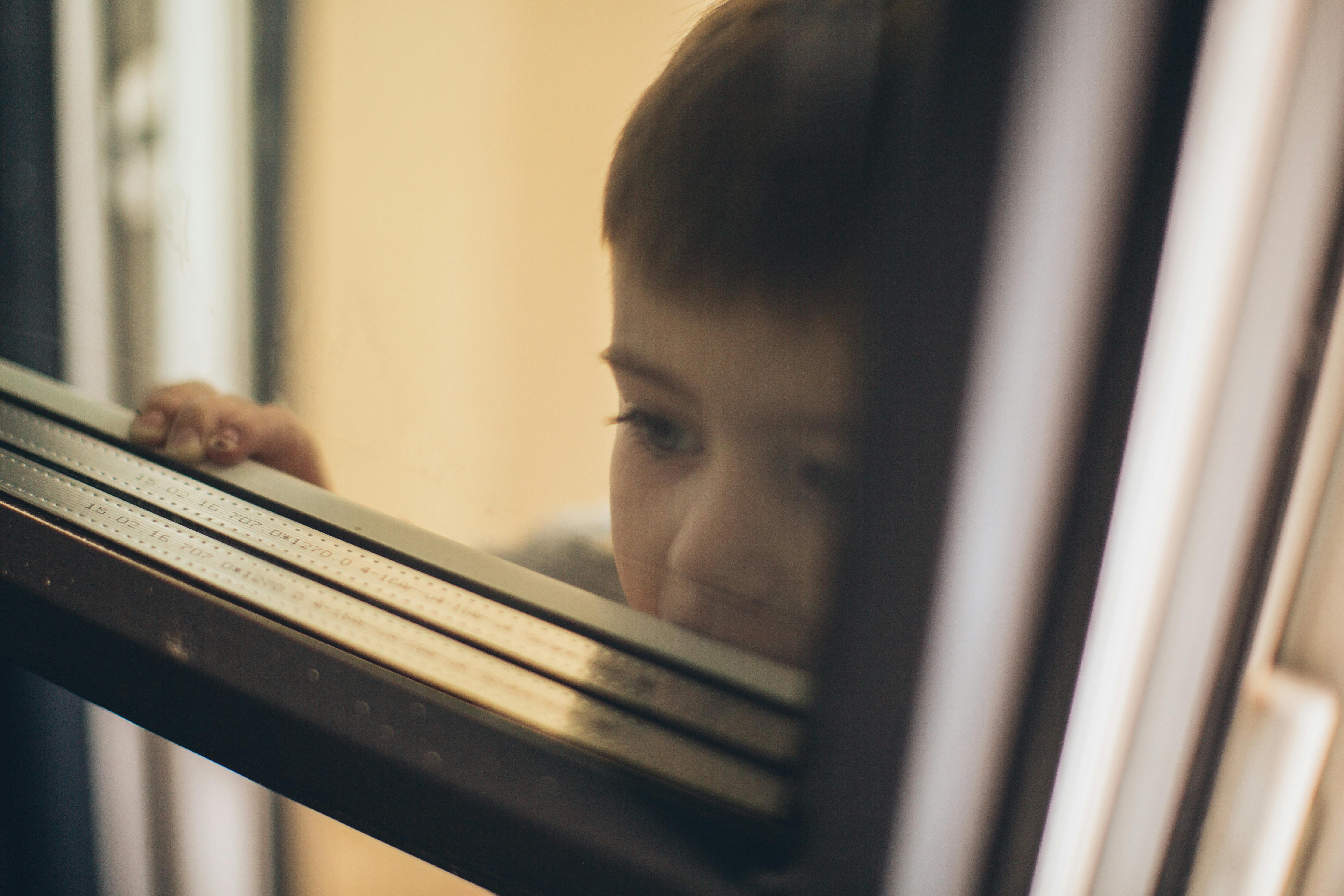 Child Looking at the Window · Free Stock Photo