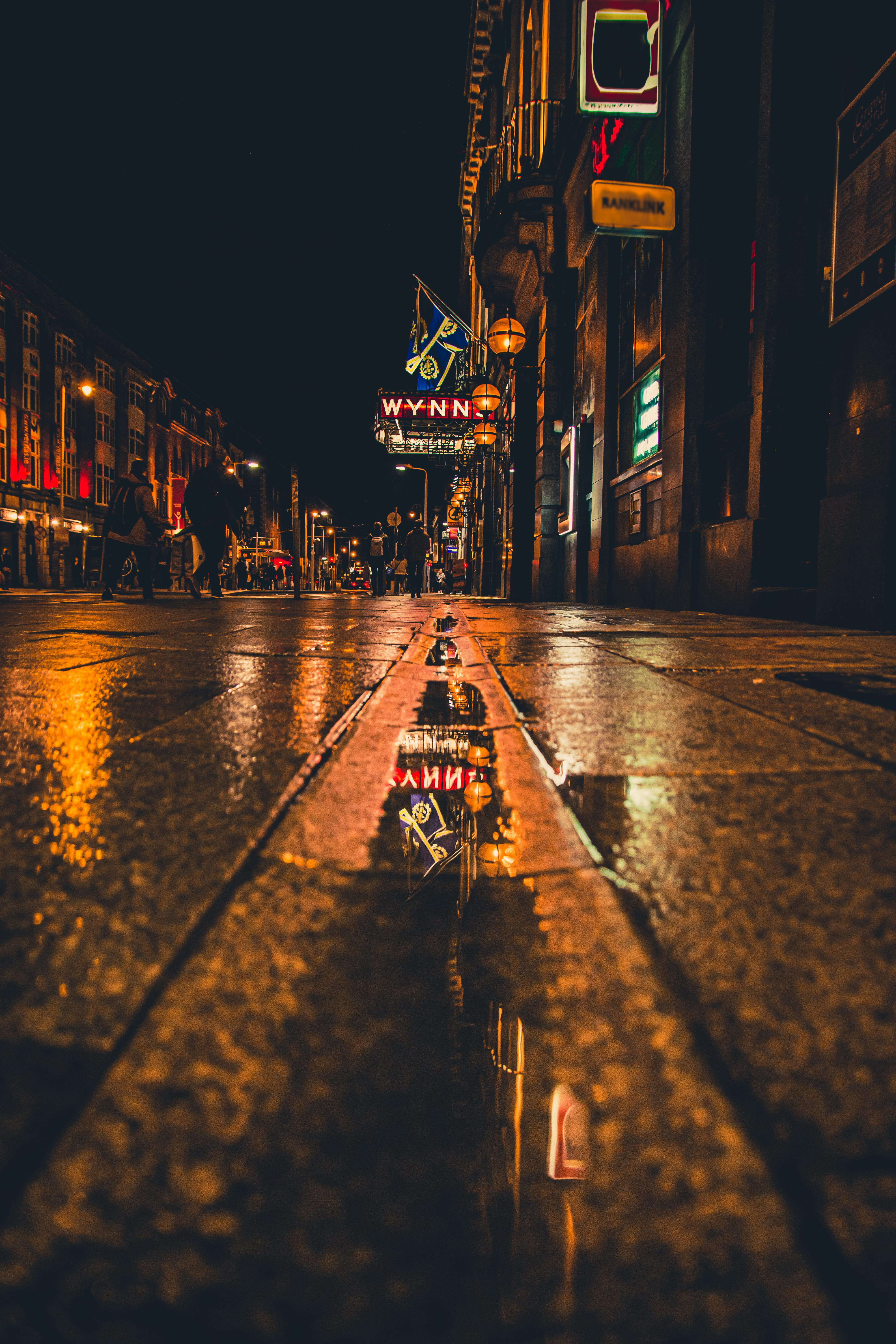 Wet Pavement in Close-up Photography · Free Stock Photo
