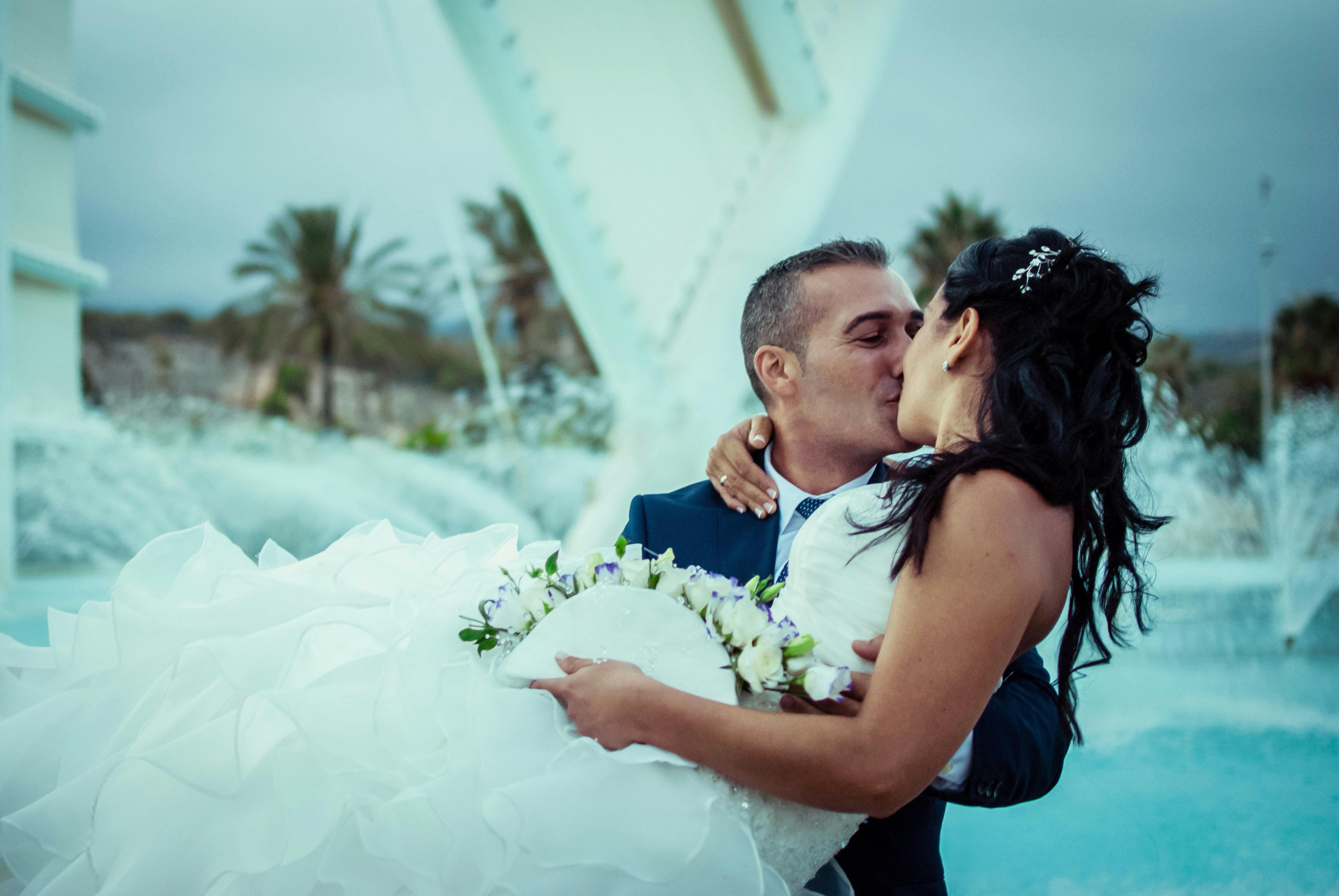Close Up Photo of Married Couple Kissing · Free Stock Photo