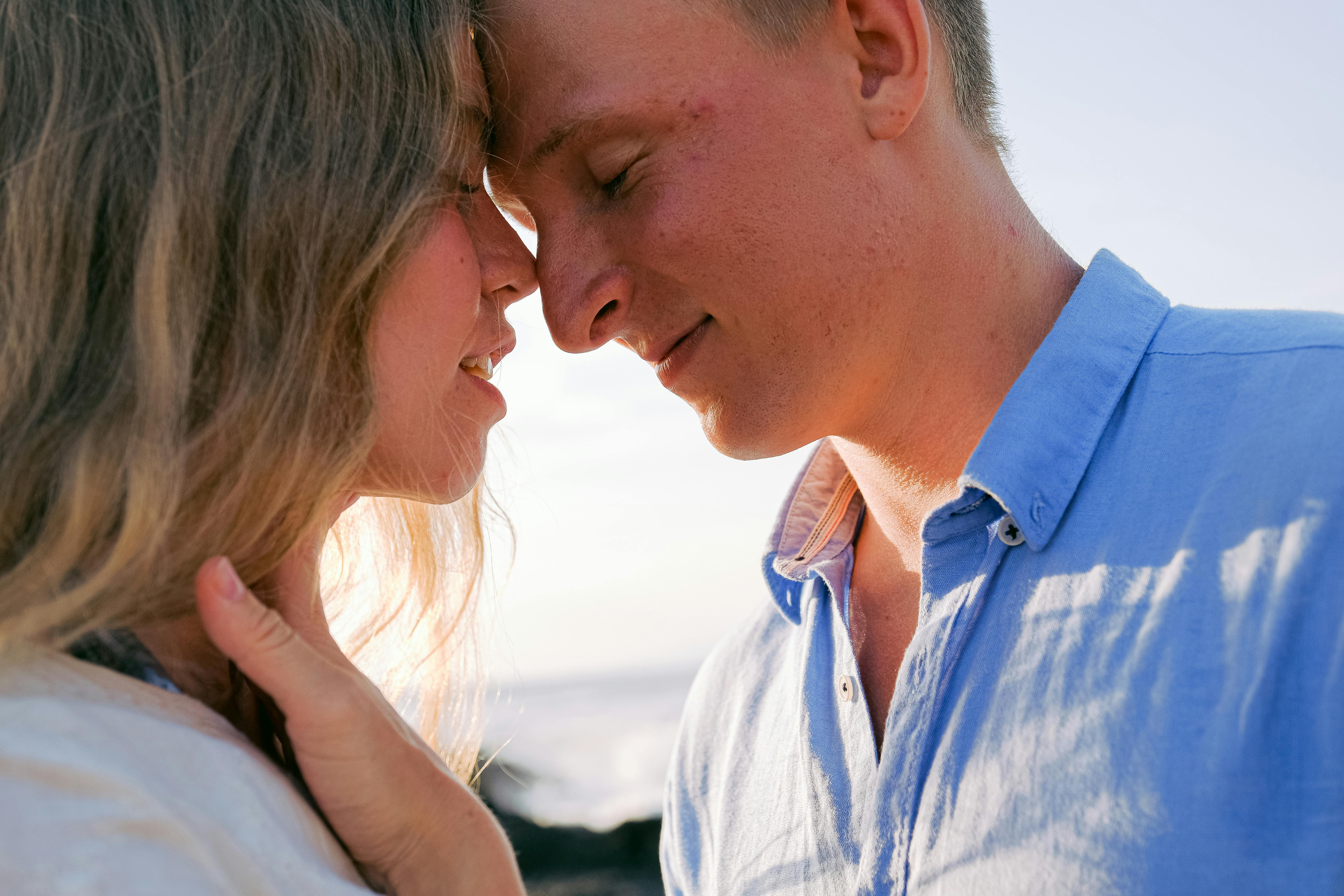 Couple Face to Face with Their Eyes Closed · Free Stock Photo