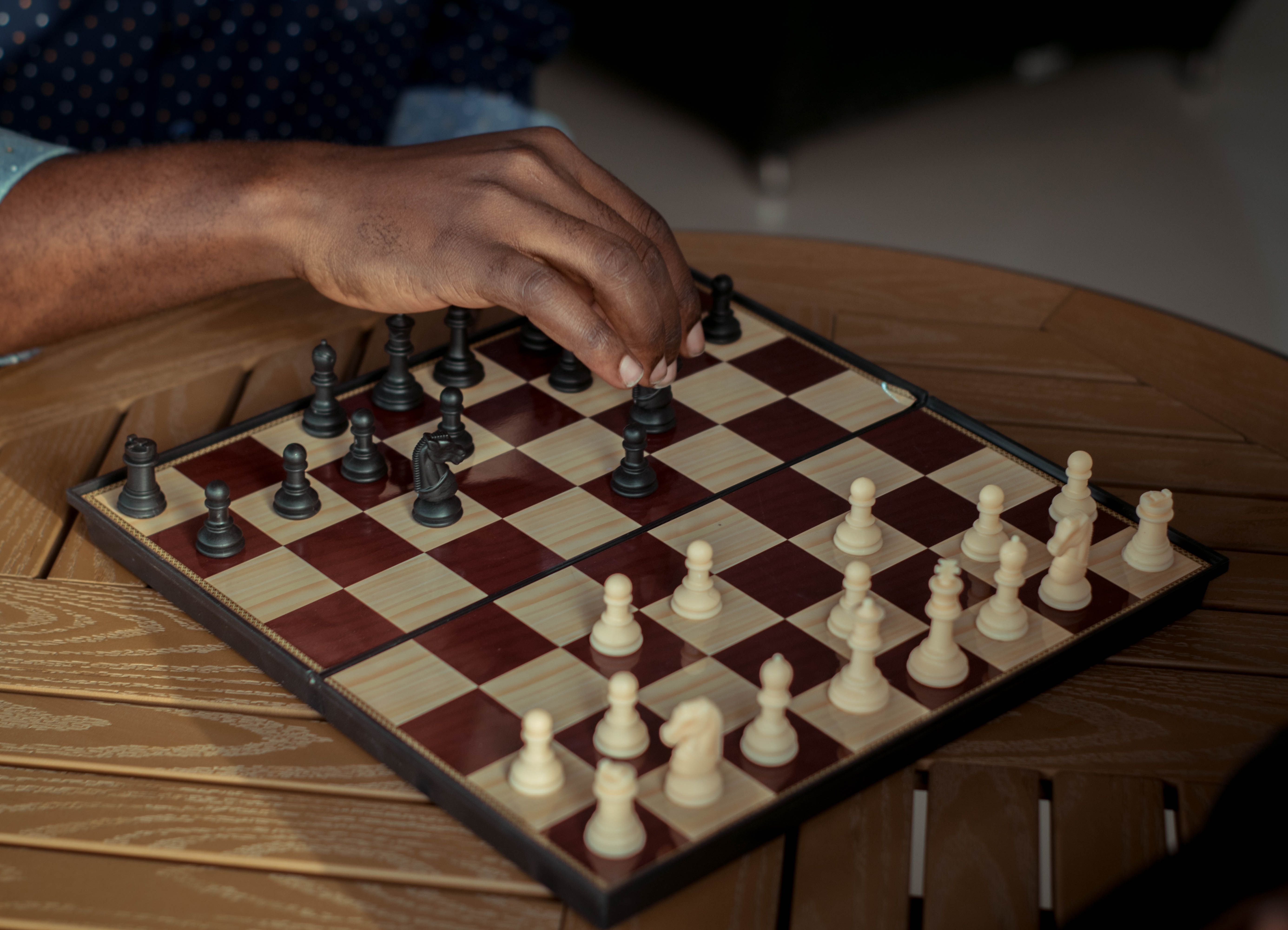 A Bored Woman Playing Chess · Free Stock Photo