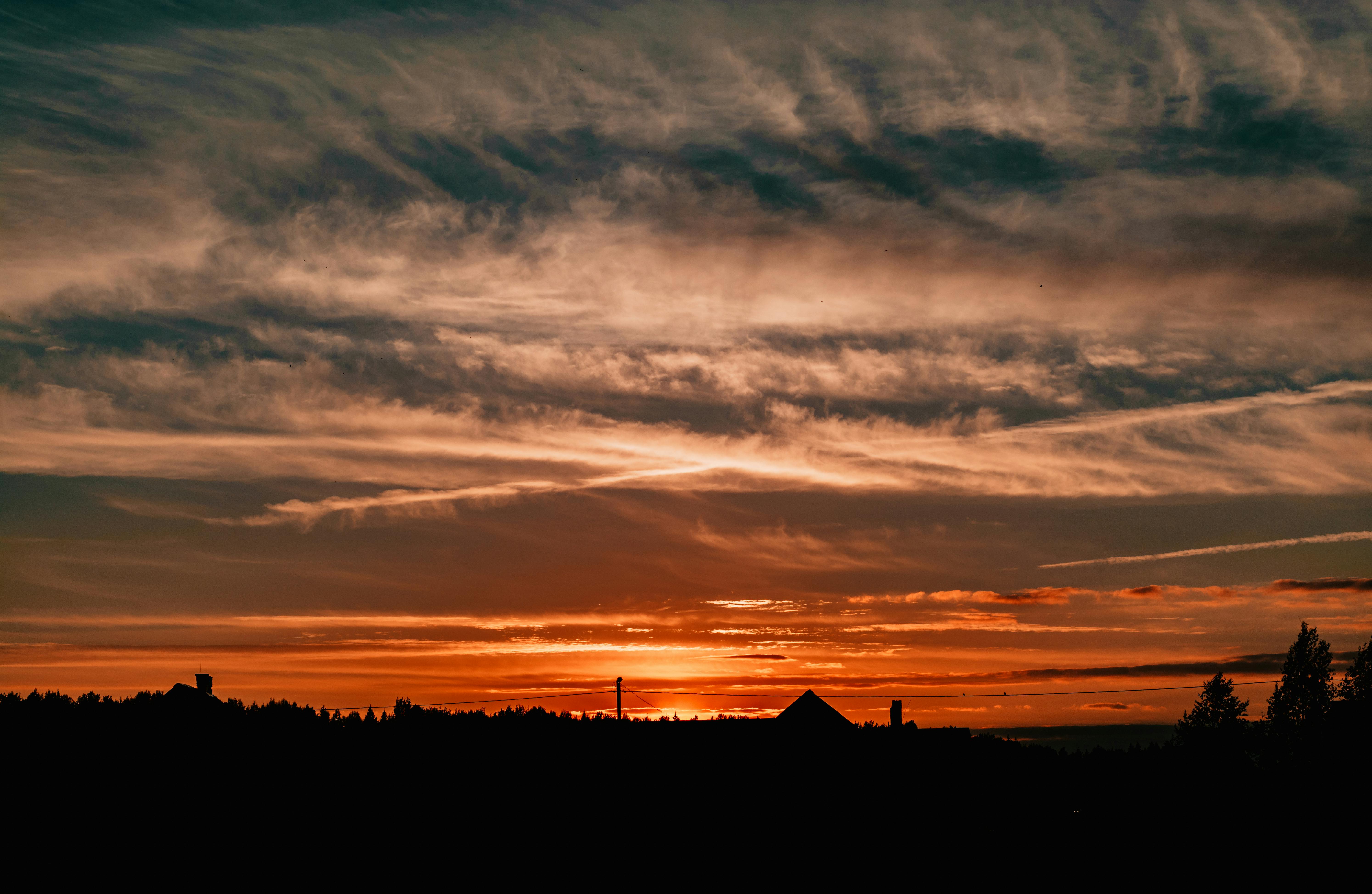 Silhouette Of House During Sunset · Free Stock Photo