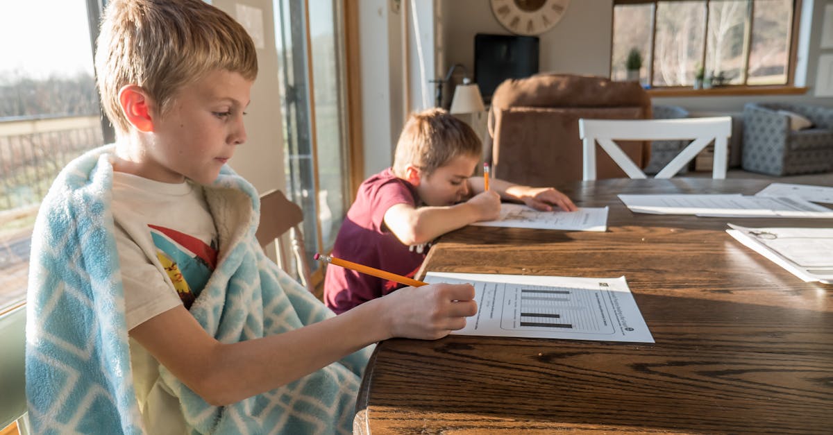Schoolkids doing study task at home · Free Stock Photo Schoolkids doing study task at home · Free Stock Photo
