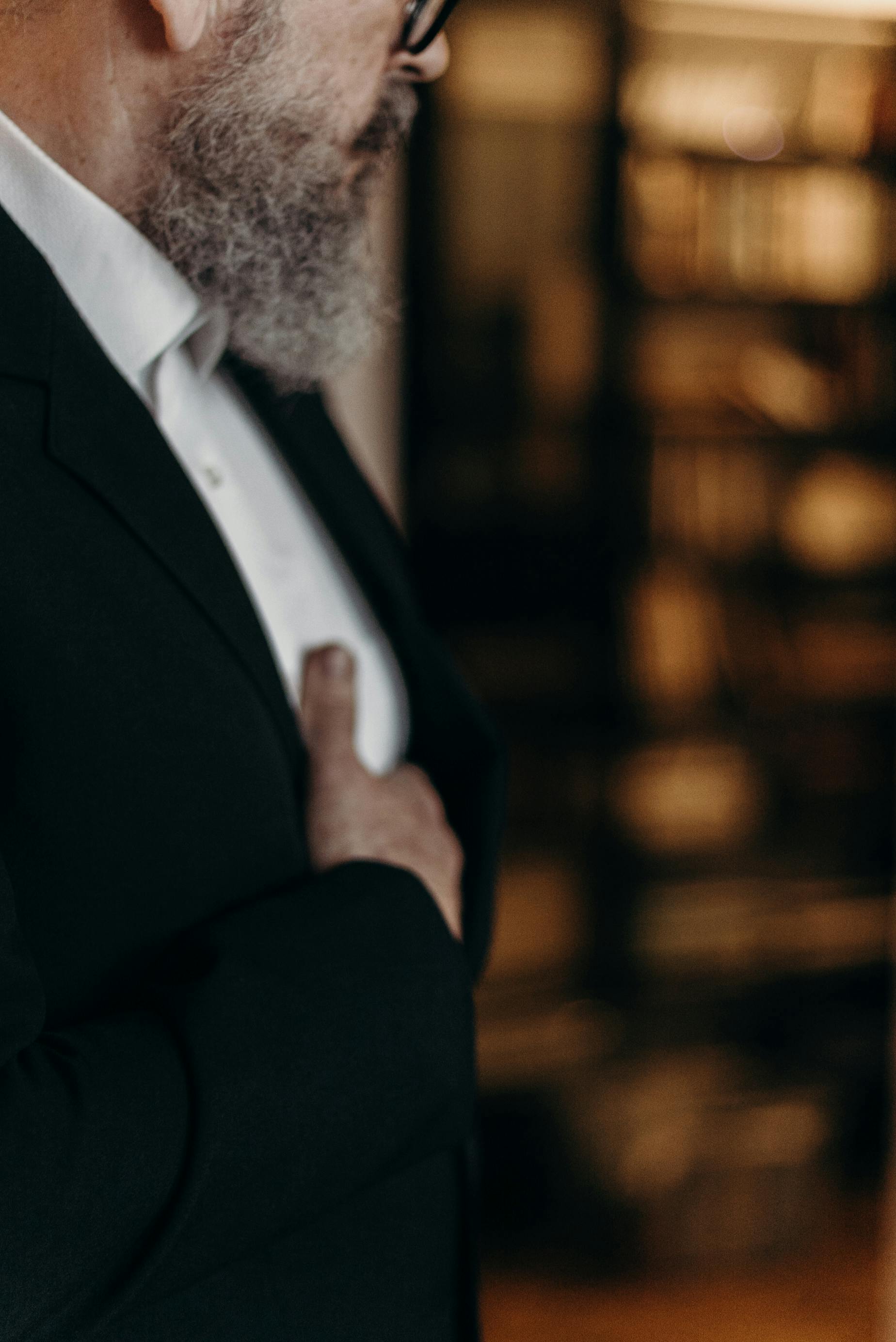Side View Of A Man In Black Suit · Free Stock Photo