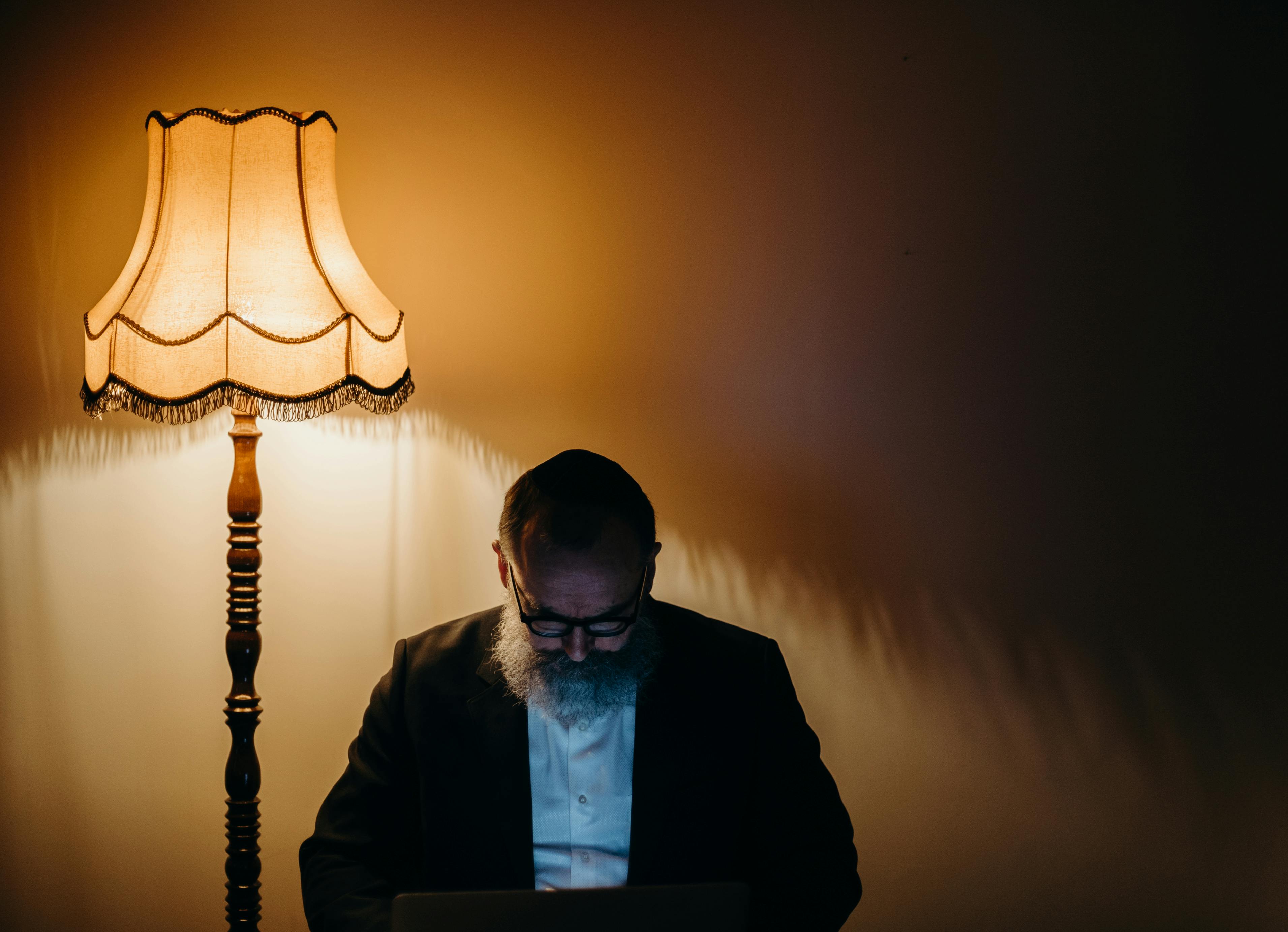 Photo Of Man Beside Lamp · Free Stock Photo