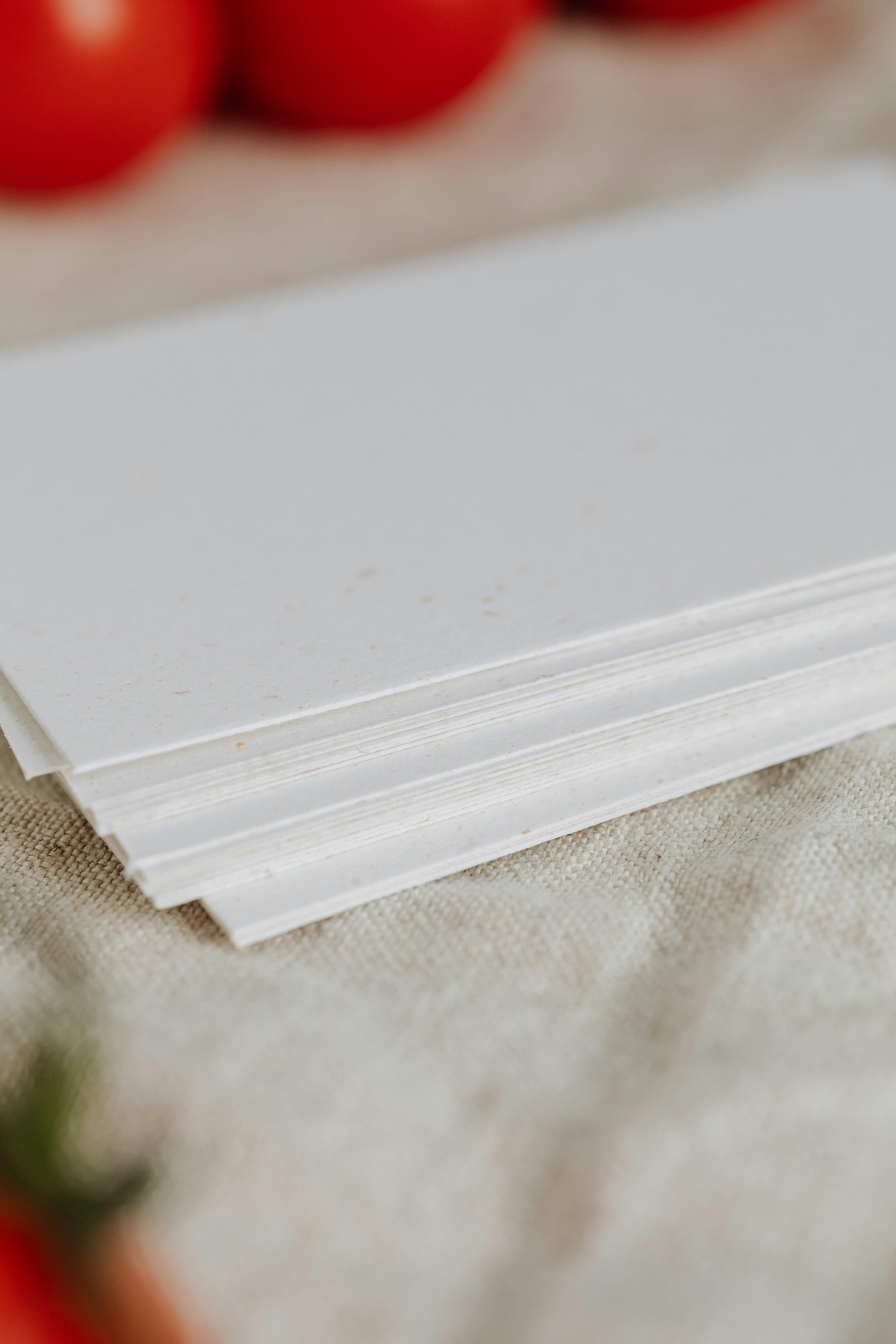 Photo Of Stacked Clear Papers · Free Stock Photo