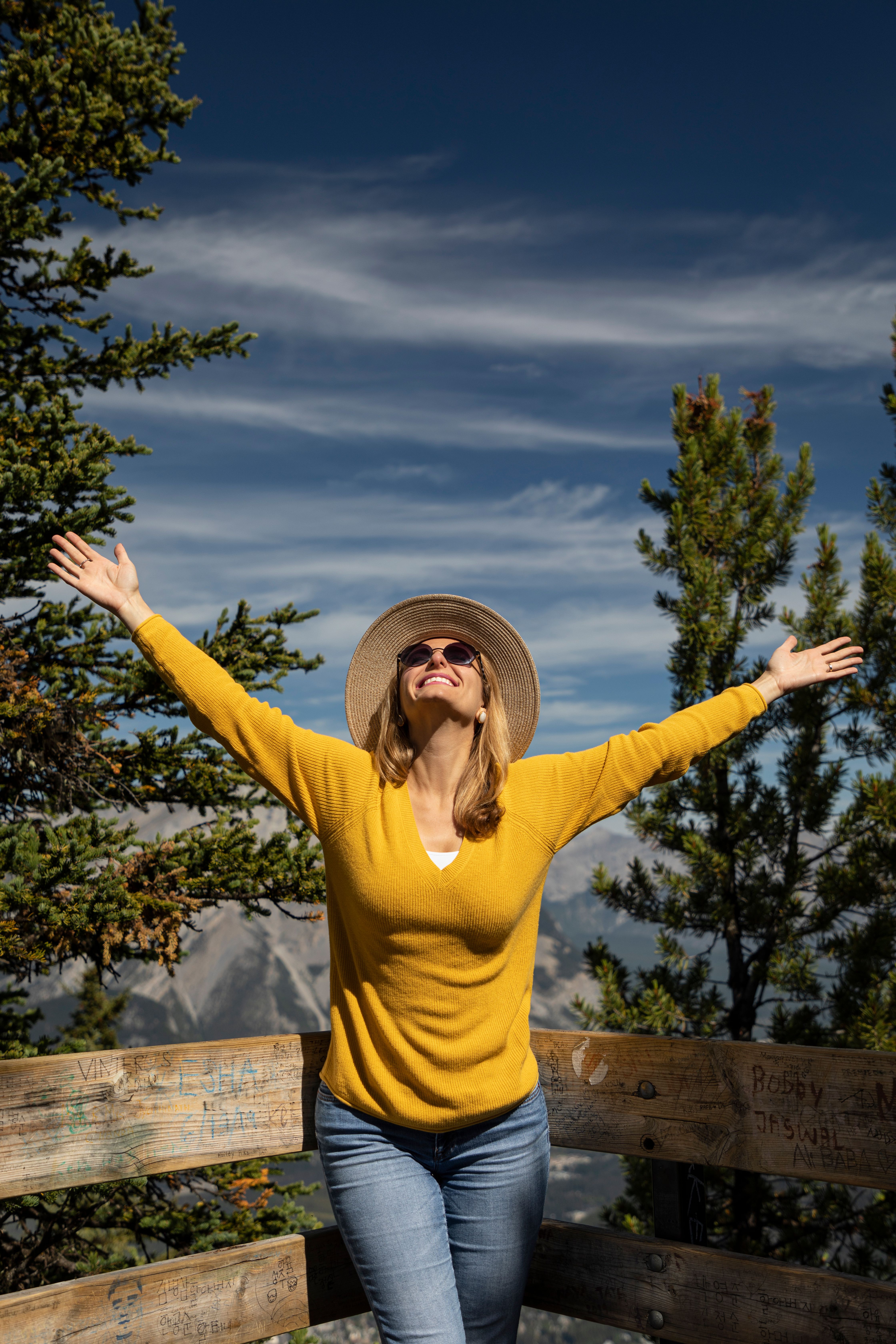 Back View of a Woman Spreading Her Arms · Free Stock Photo