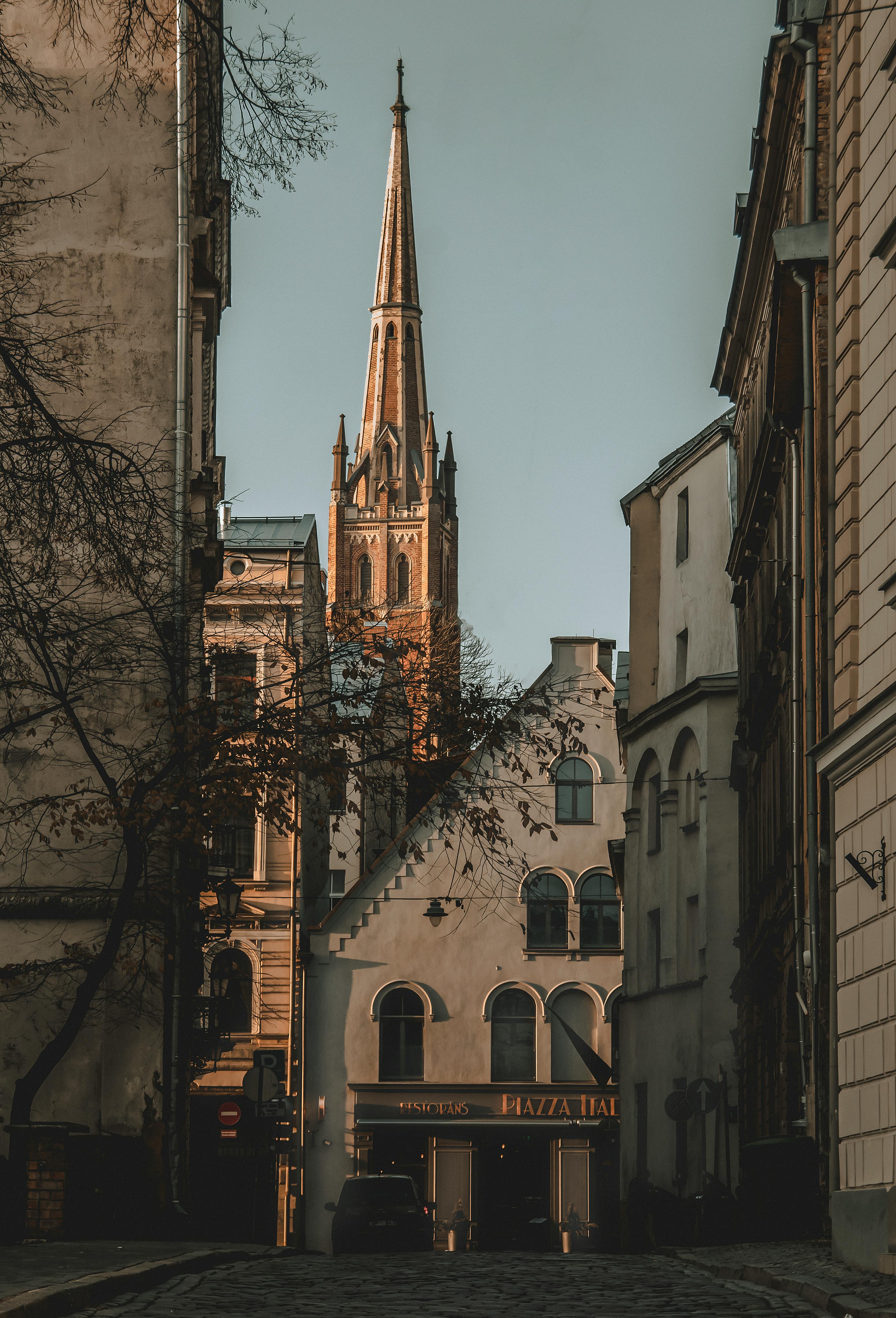 Old masonry building facades on city street · Free Stock Photo