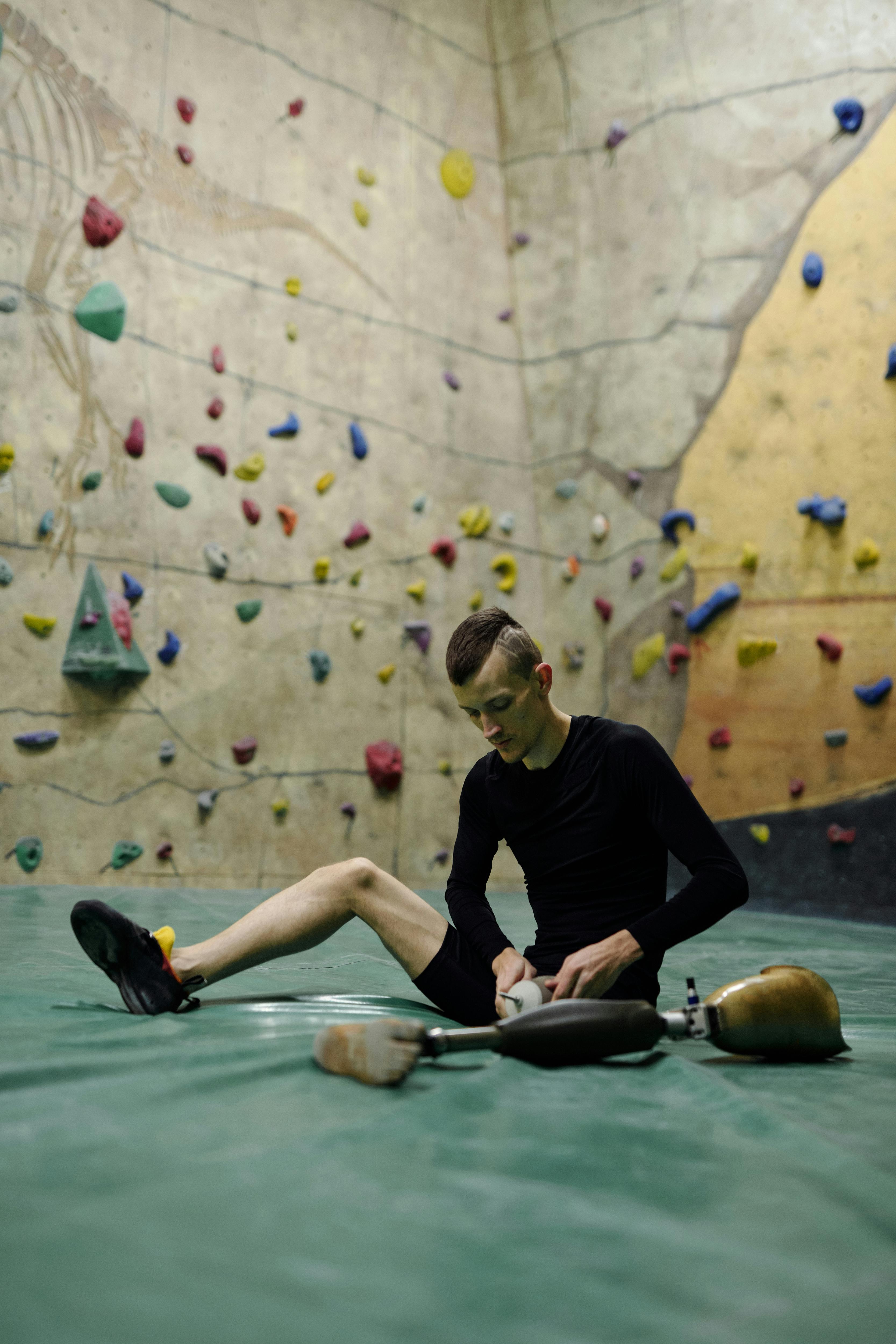 Man Taking Off Prosthetic Leg · Free Stock Photo