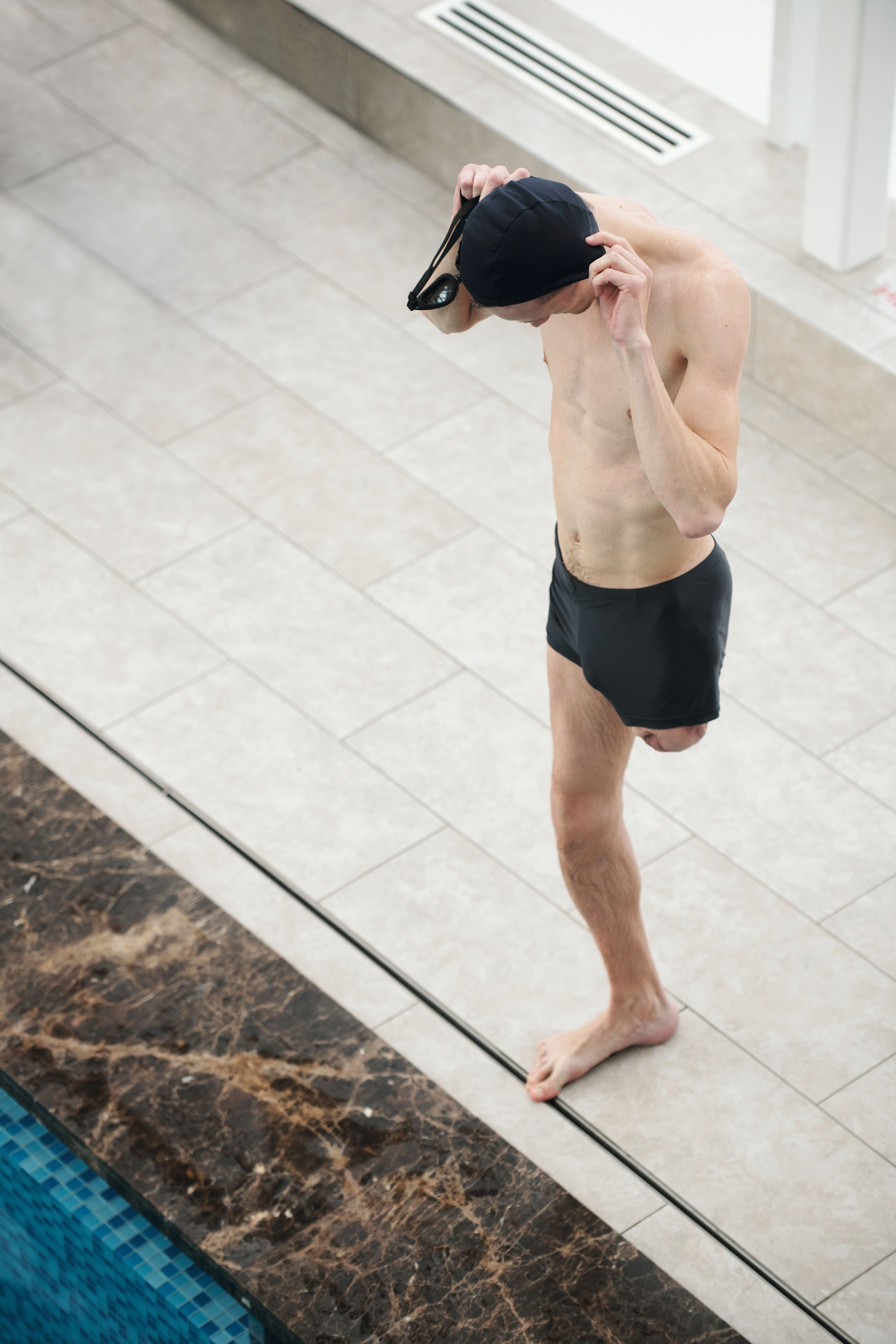 Photo Of Man Standing On Poolside · Free Stock Photo