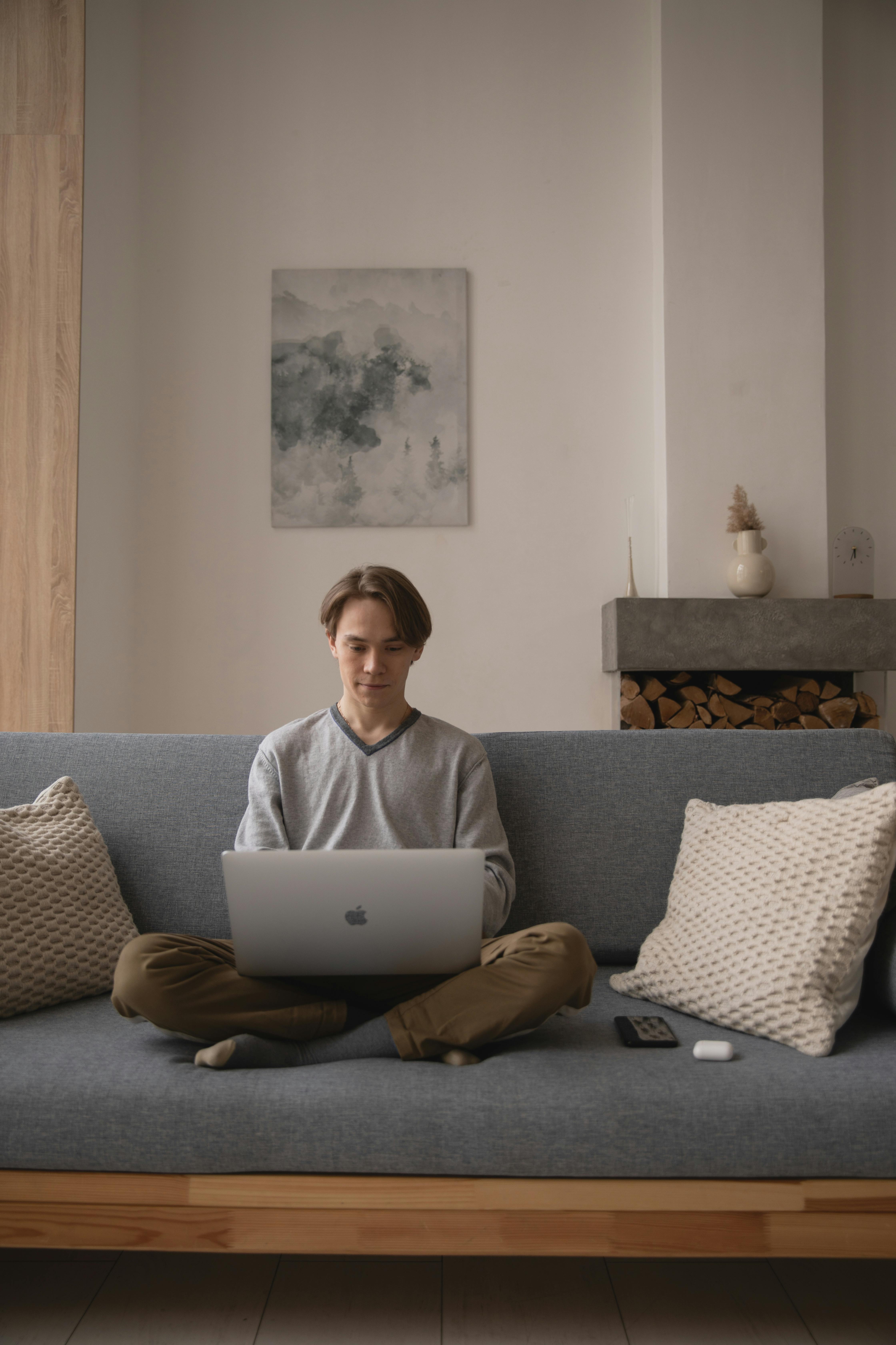 Beard Man in Black Suit Sitting on White Couch · Free Stock Photo