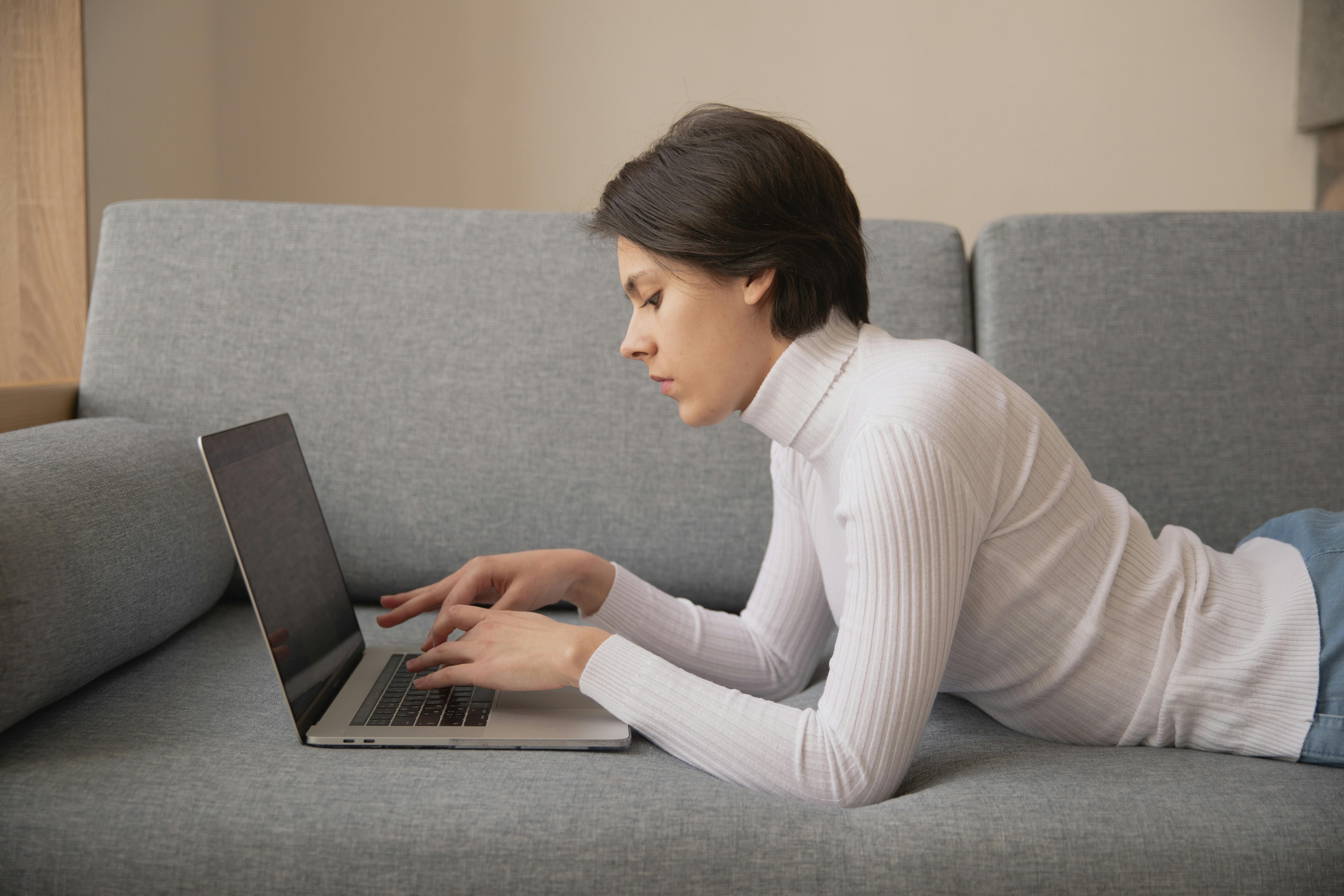 Photo Of Person Using Laptop · Free Stock Photo