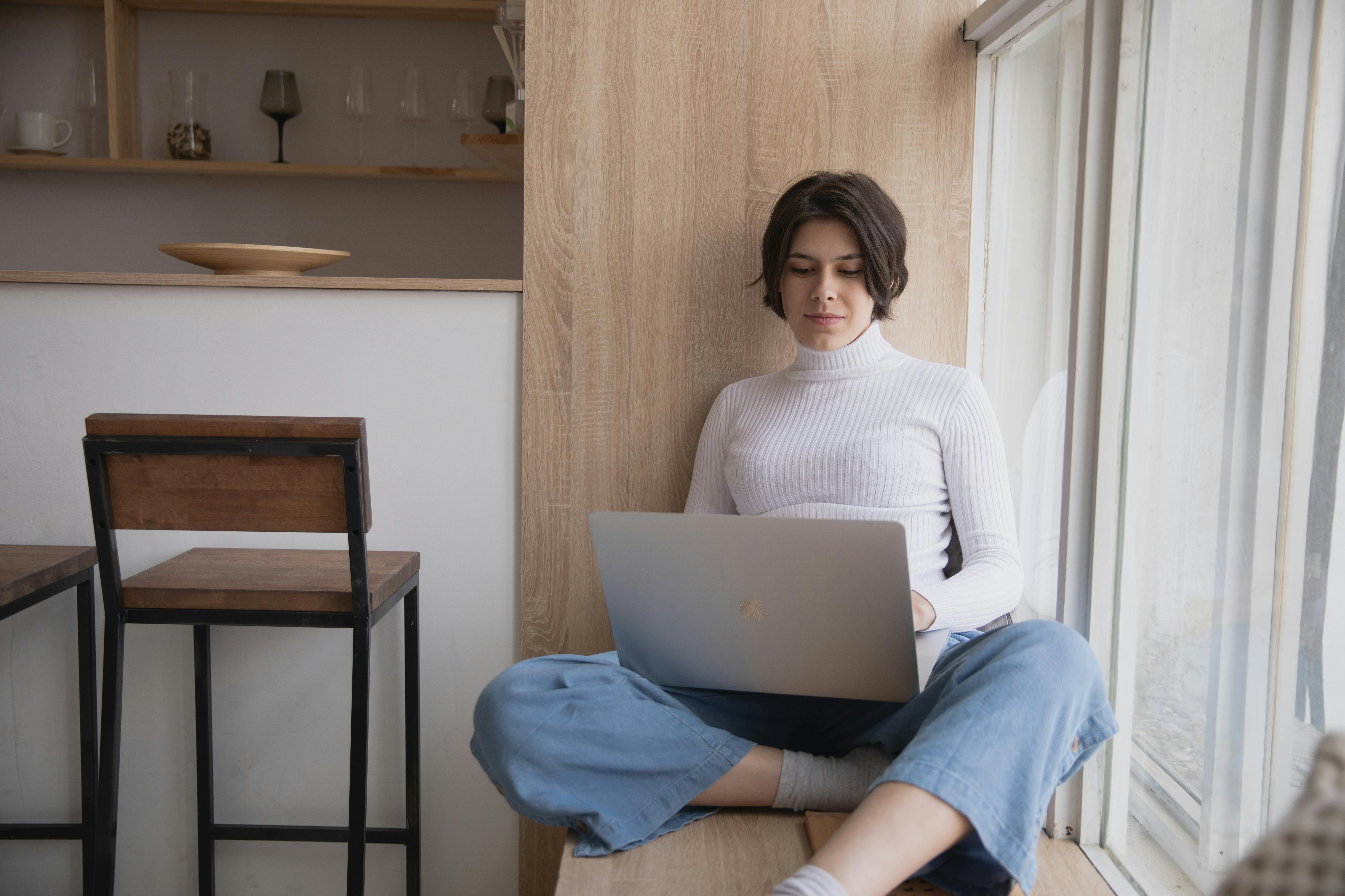 Photography of a Woman Using Laptop · Free Stock Photo