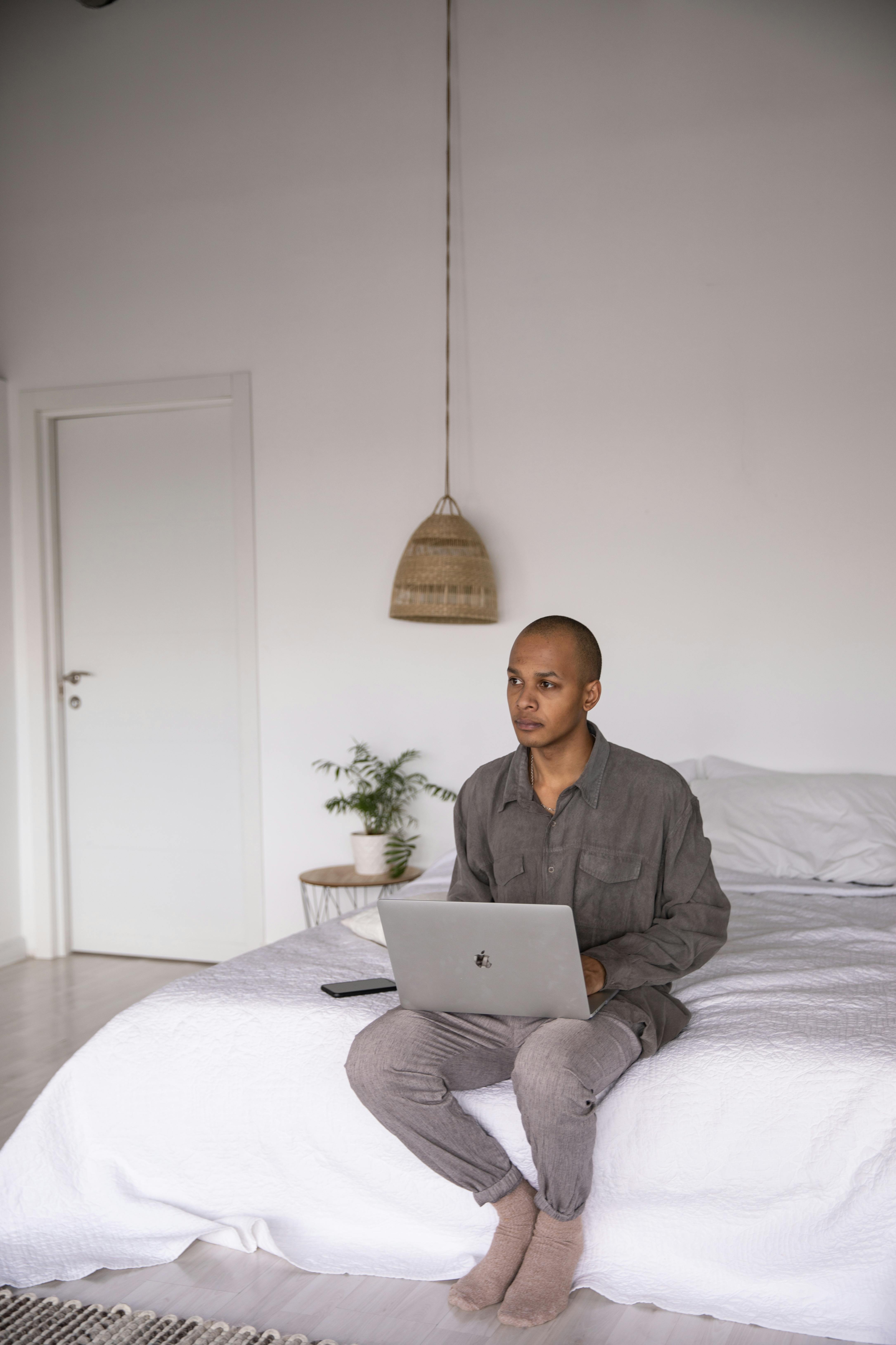 Photo Of Man Using Laptop · Free Stock Photo