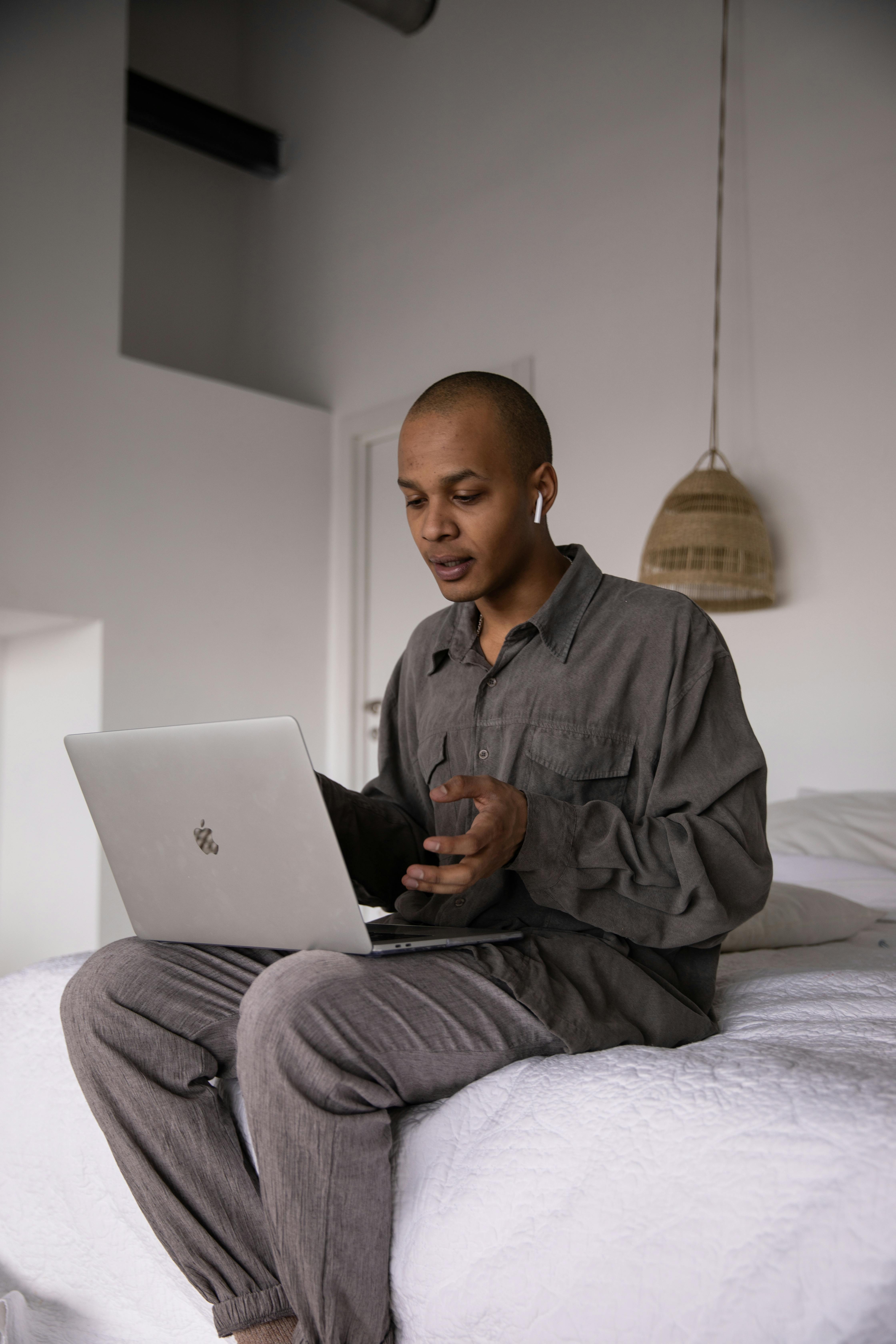 Photo Of Man Using Laptop · Free Stock Photo