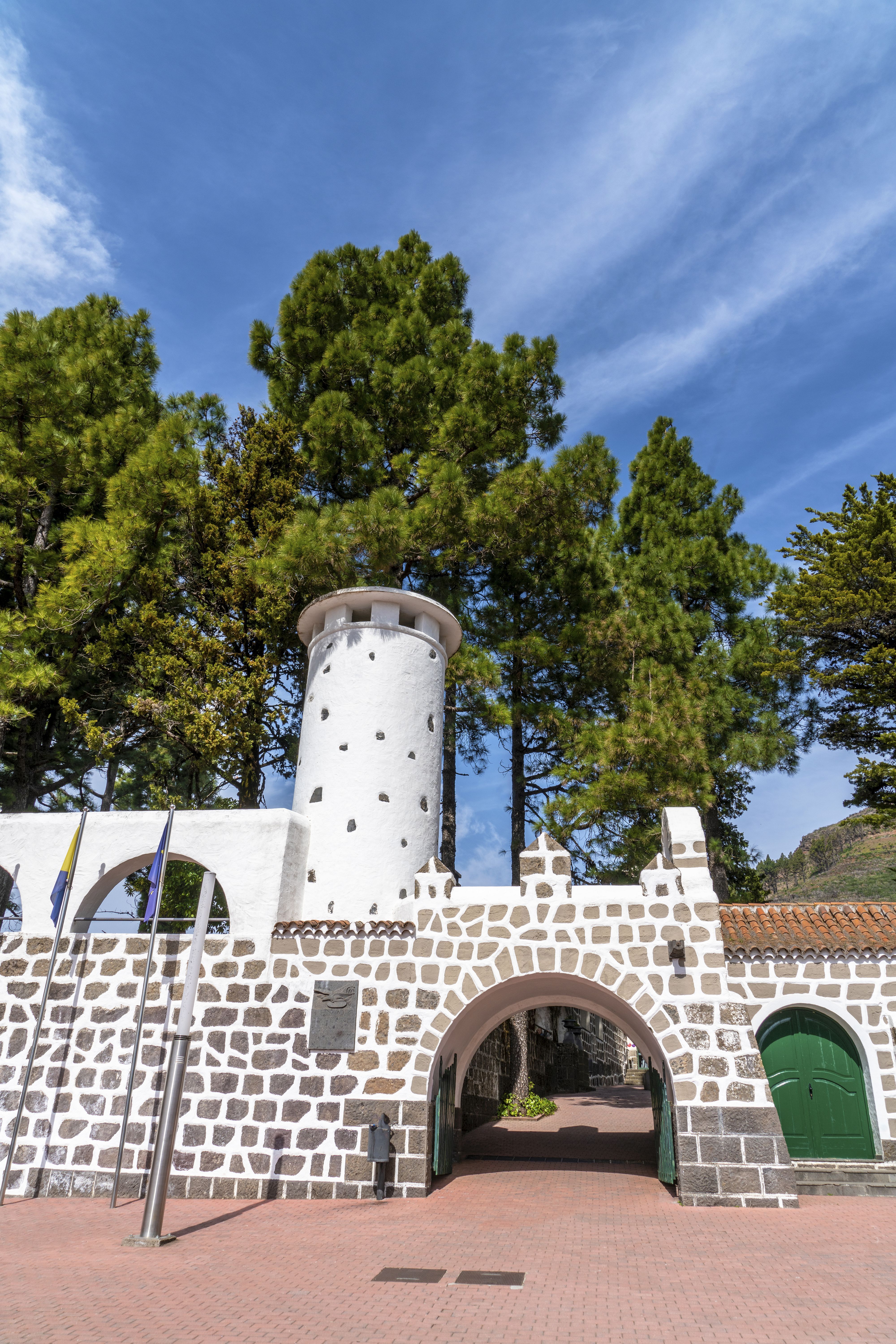 Aged stone building near greenery in summer day · Free Stock Photo