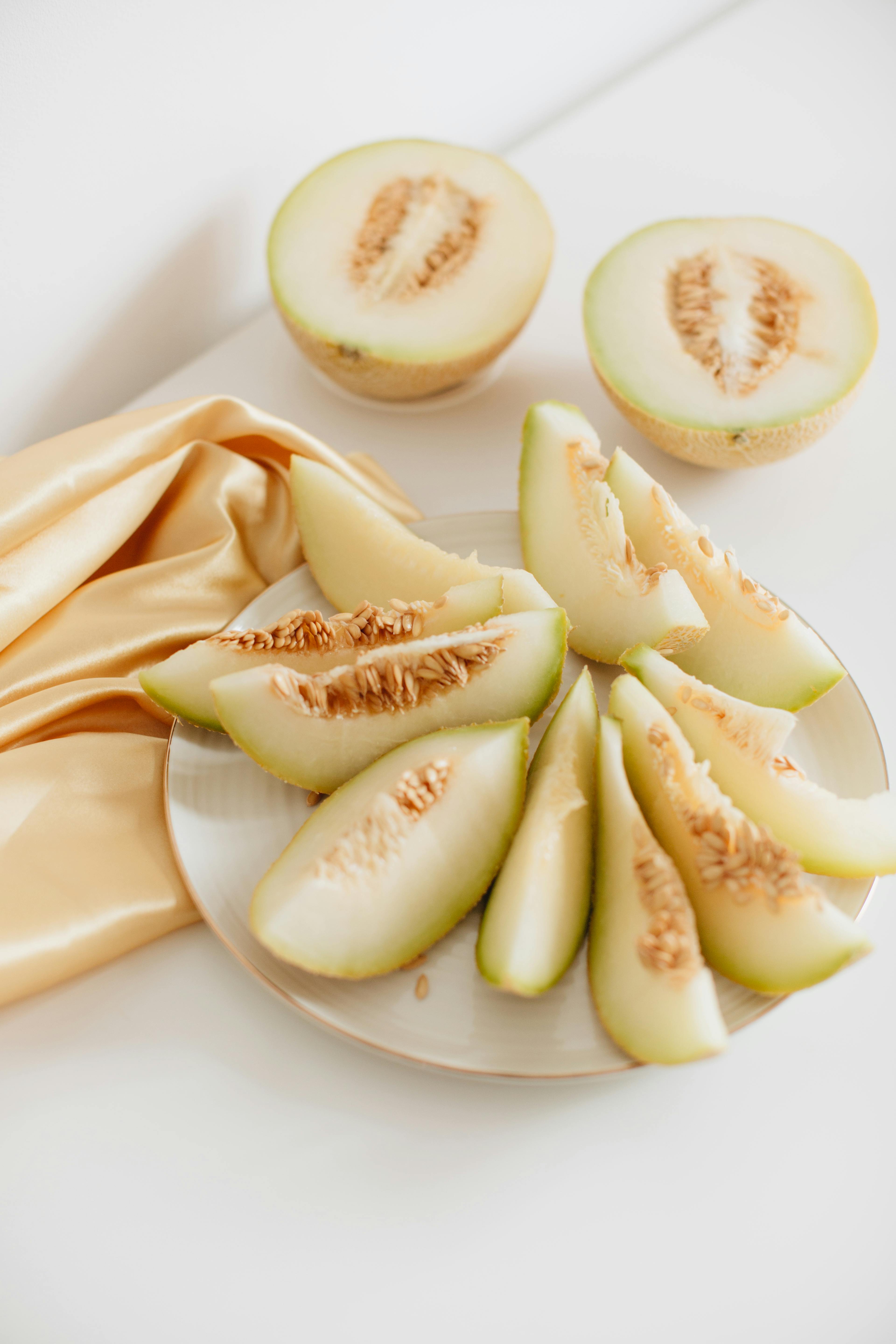 Photo Of Sliced Melon On Plate · Free Stock Photo