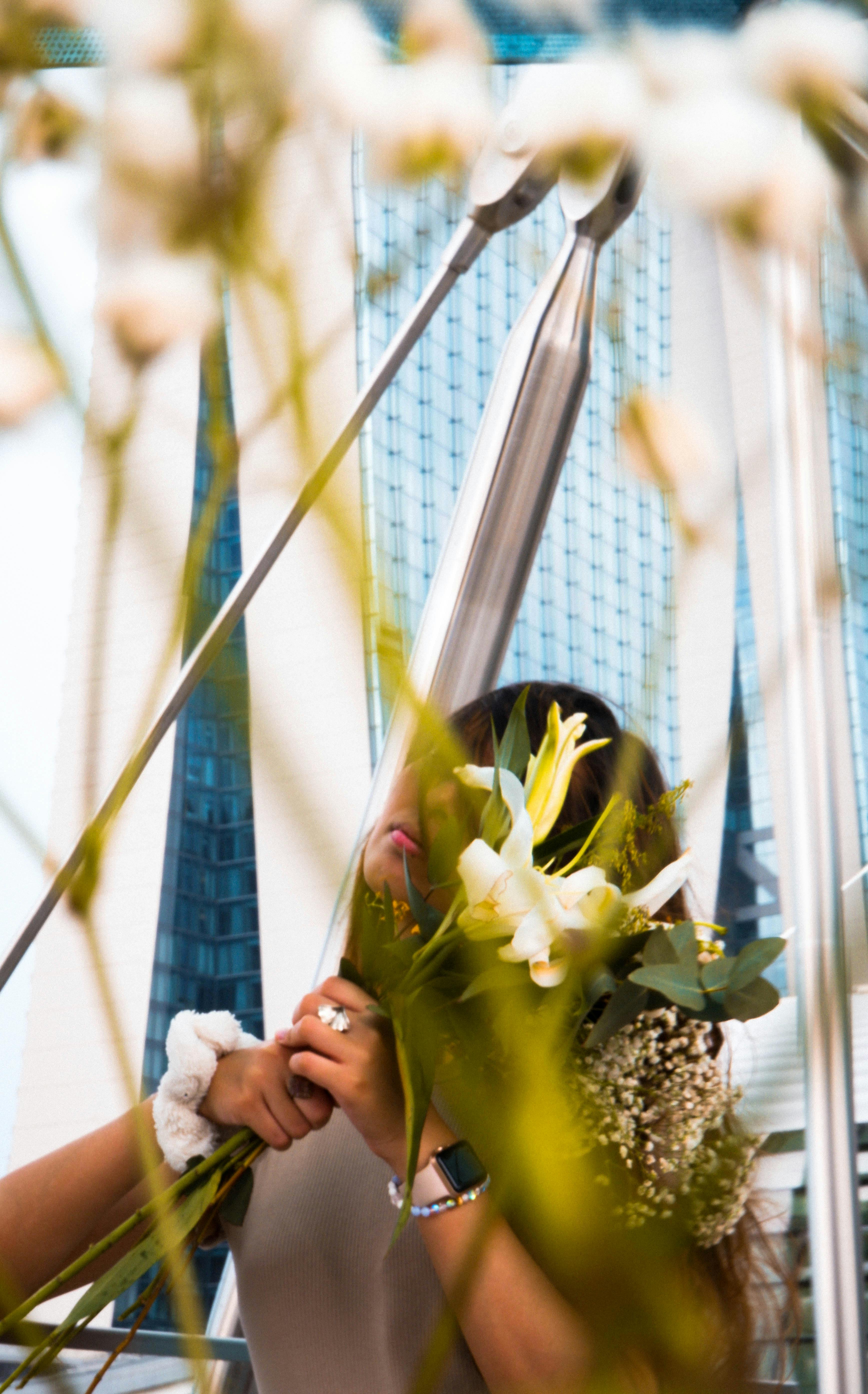 Person Holding Bouquet of Flowers · Free Stock Photo