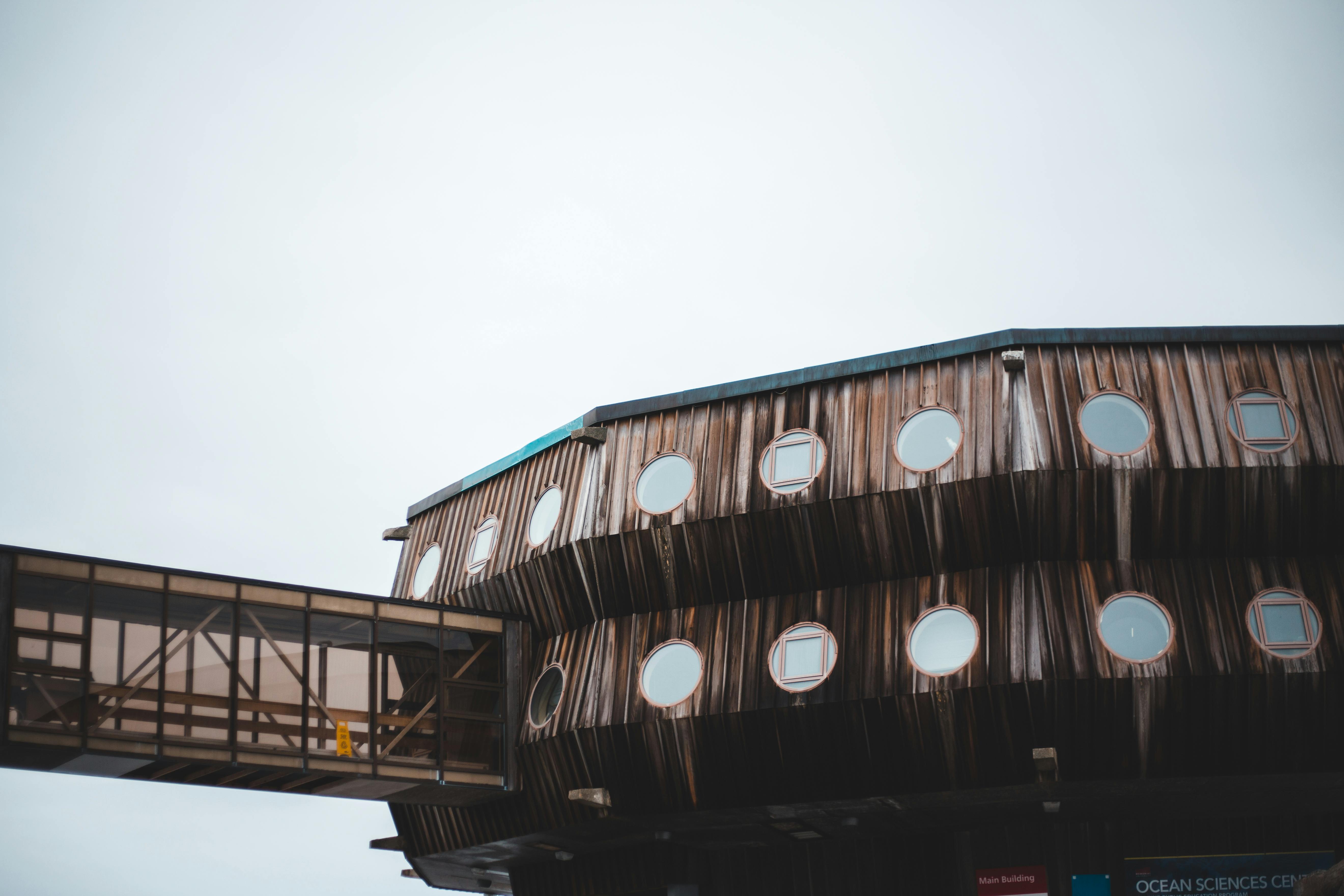 Wooden building with overground passage · Free Stock Photo