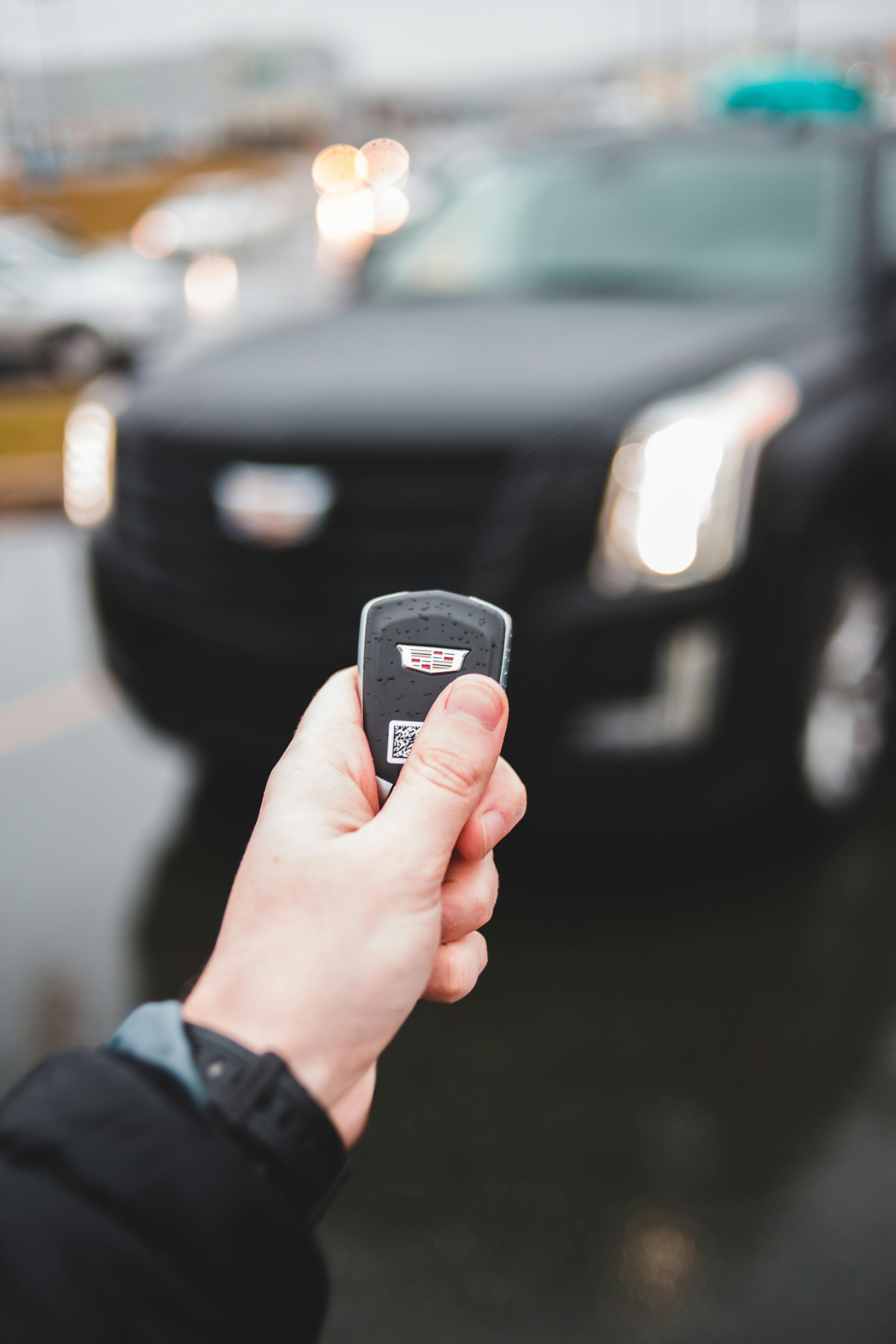 Person Holding Car Key · Free Stock Photo
