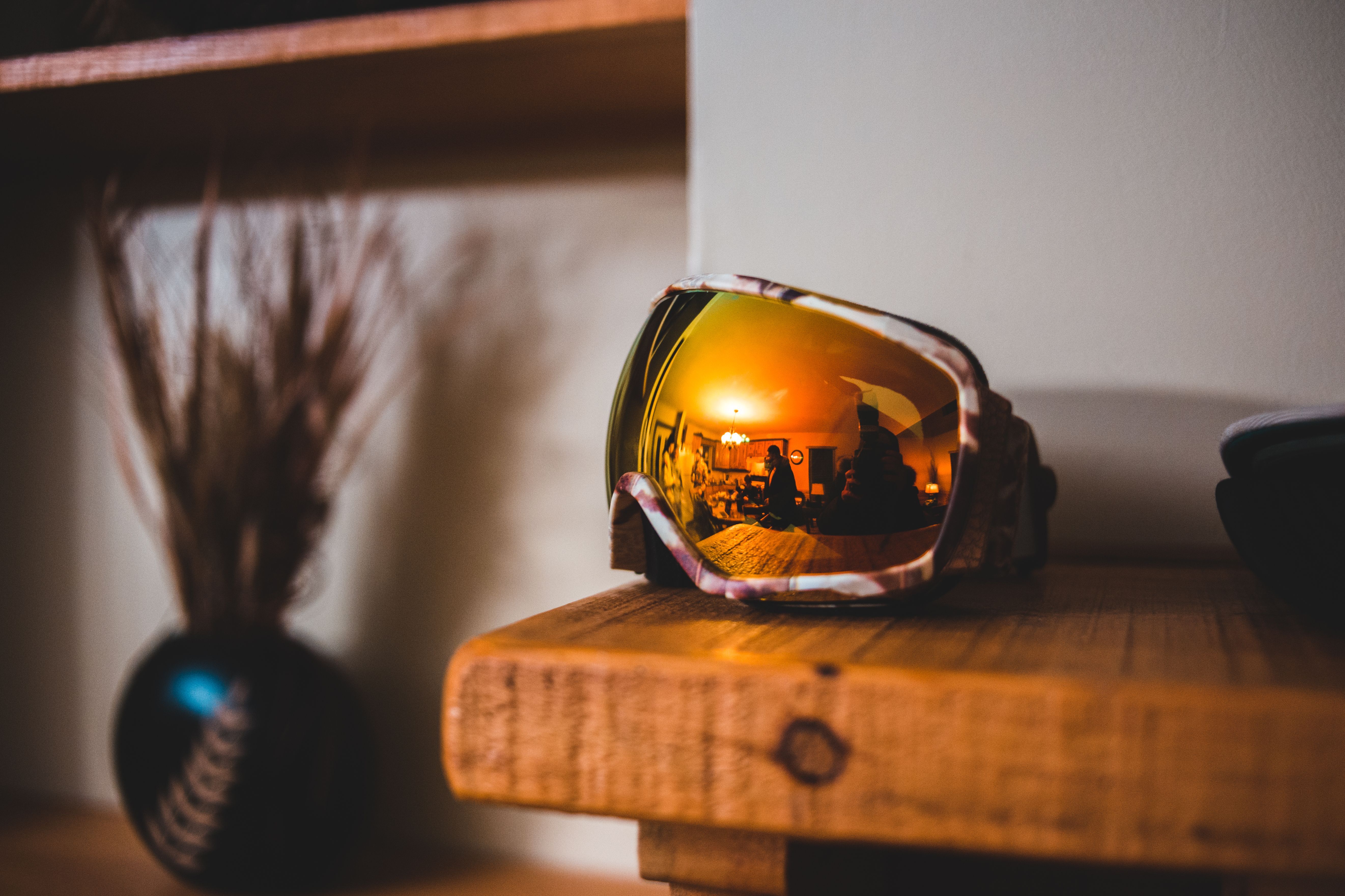 Goggles on Brown Wooden Table · Free Stock Photo