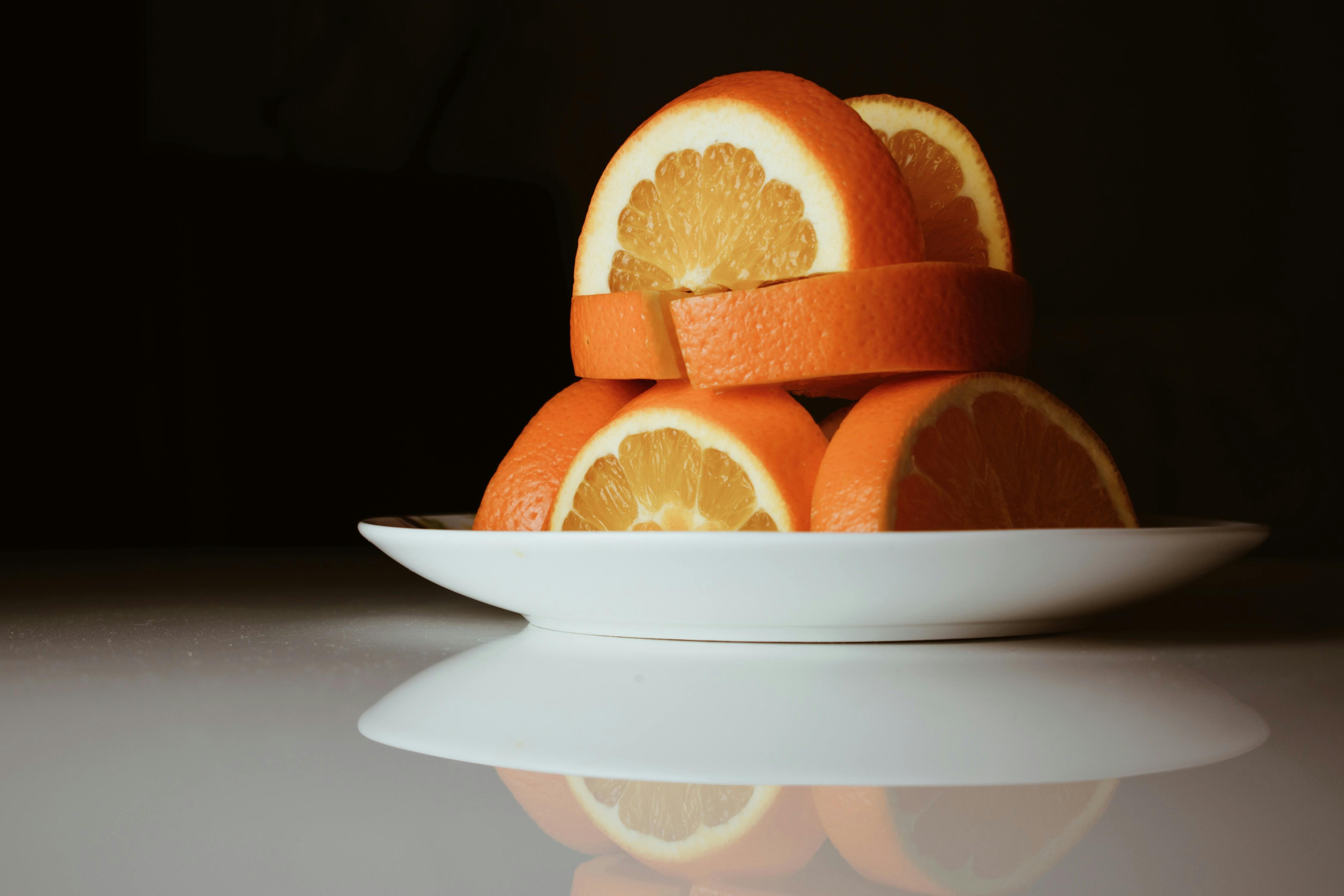 Close-Up Photo Of Sliced Oranges · Free Stock Photo