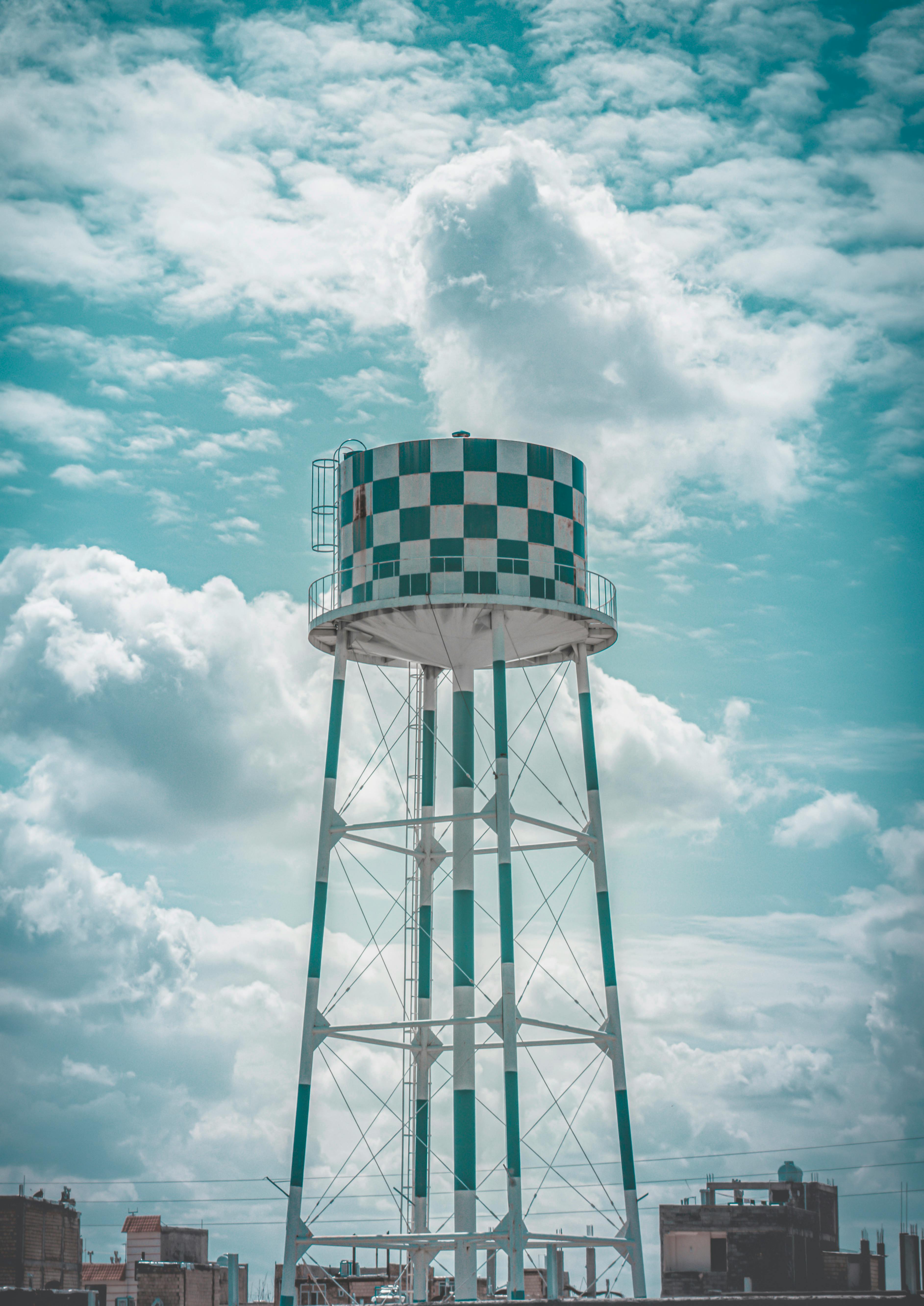 Aerial Photography of Red and White Striped Tower Near Clouds · Free ...