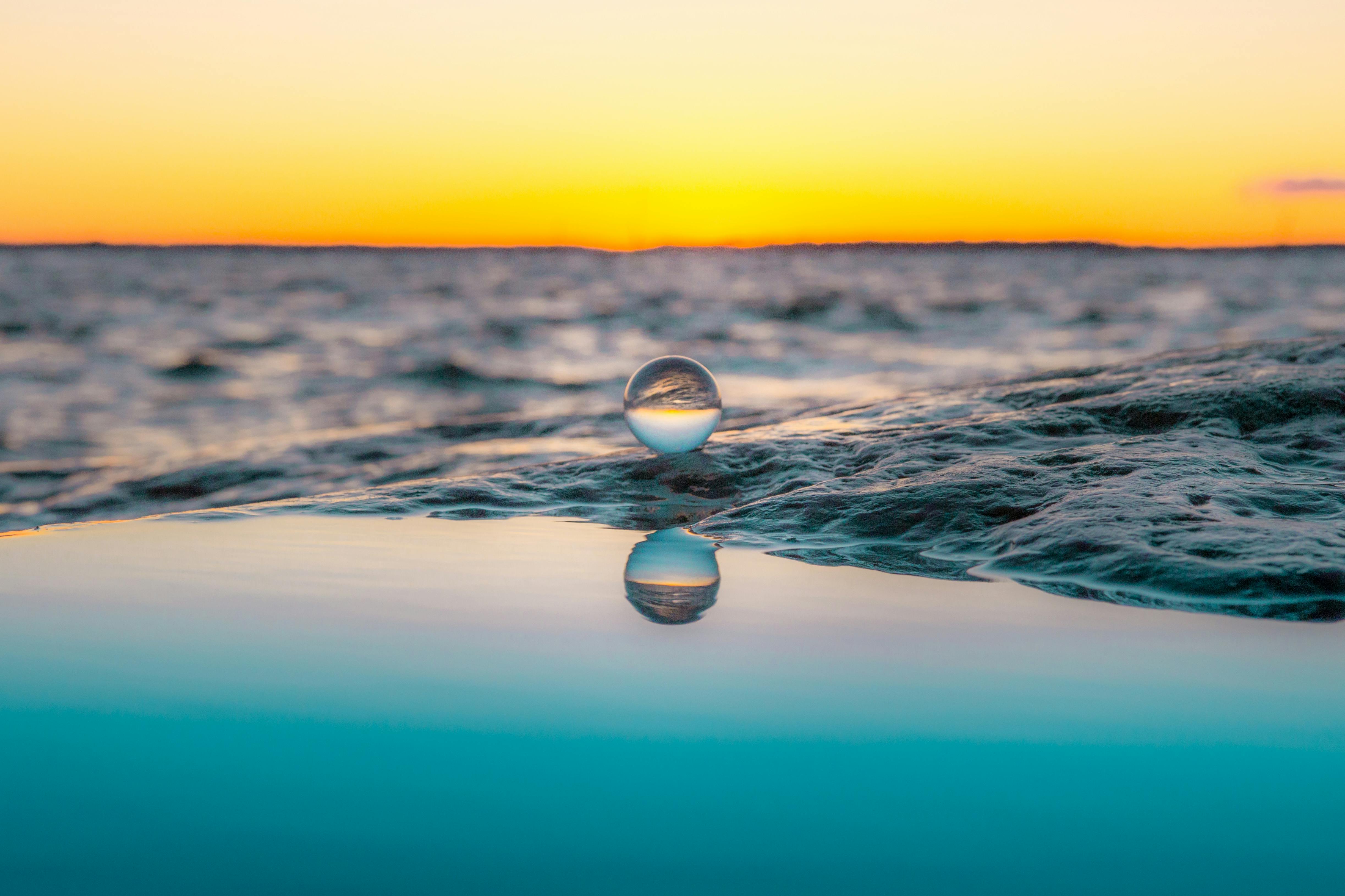 Upside Down Photo of Glass Ball on Water · Free Stock Photo
