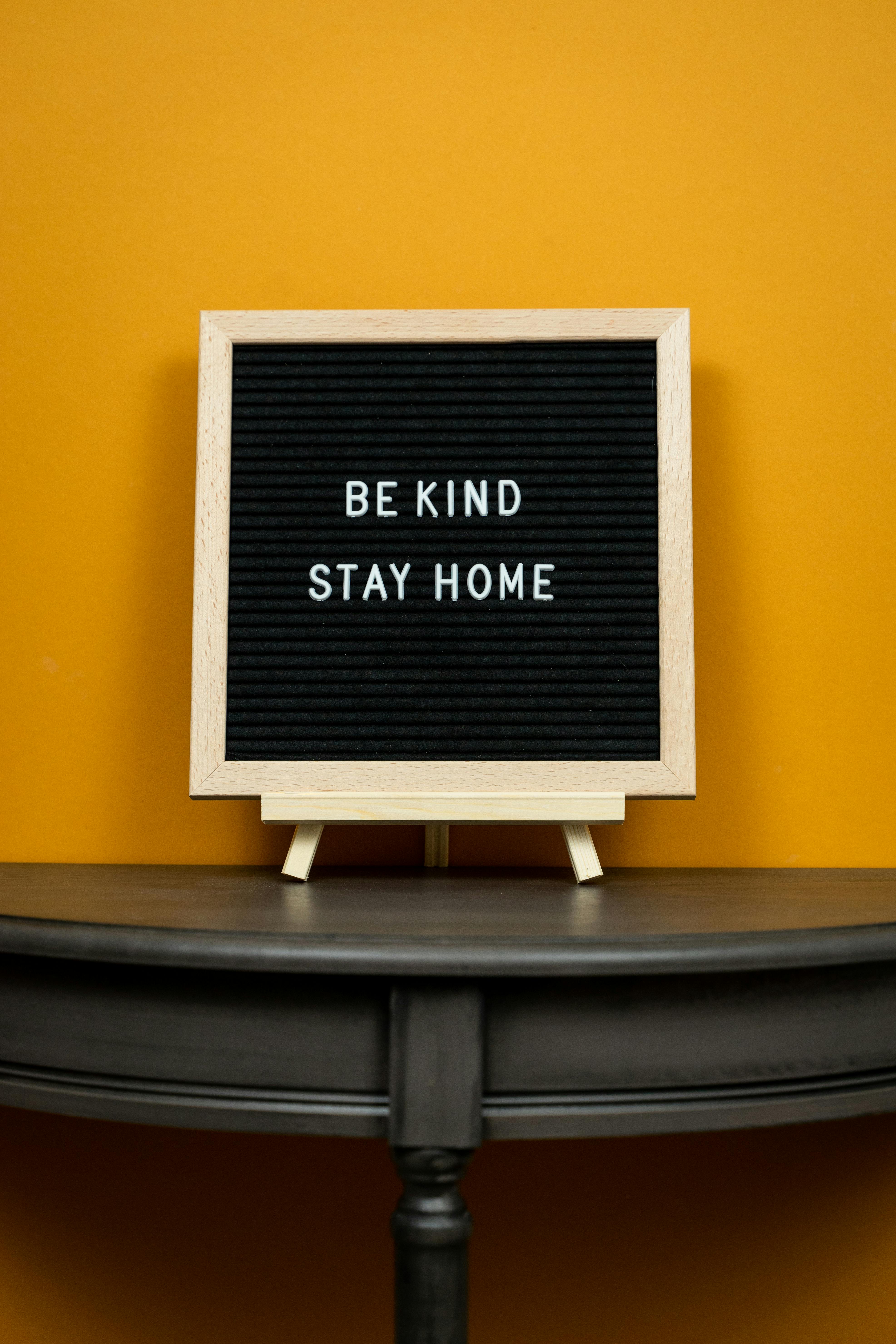 Yellow Deformed Text on Black Background · Free Stock Photo