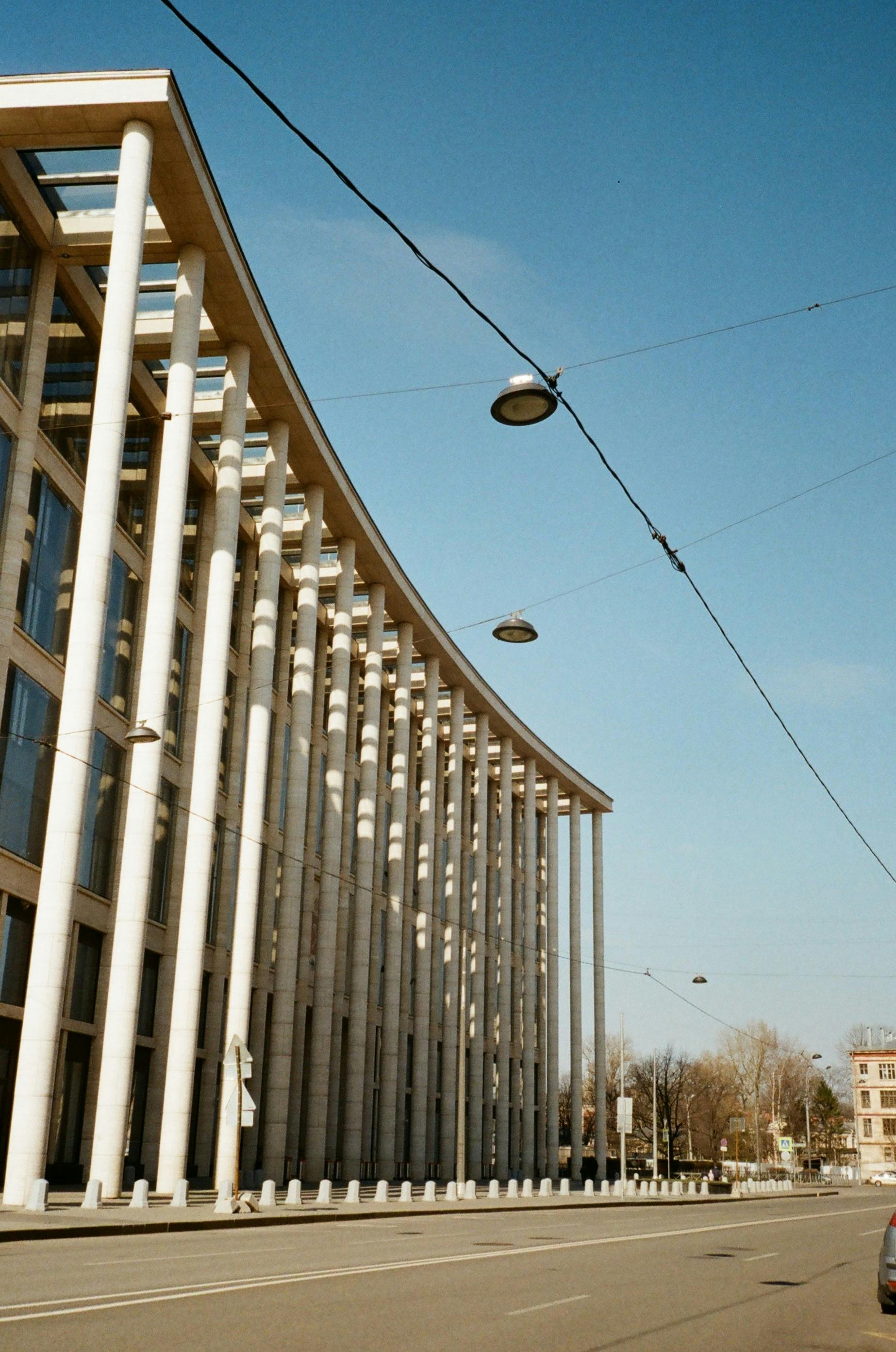 Old building near road on rainy day · Free Stock Photo