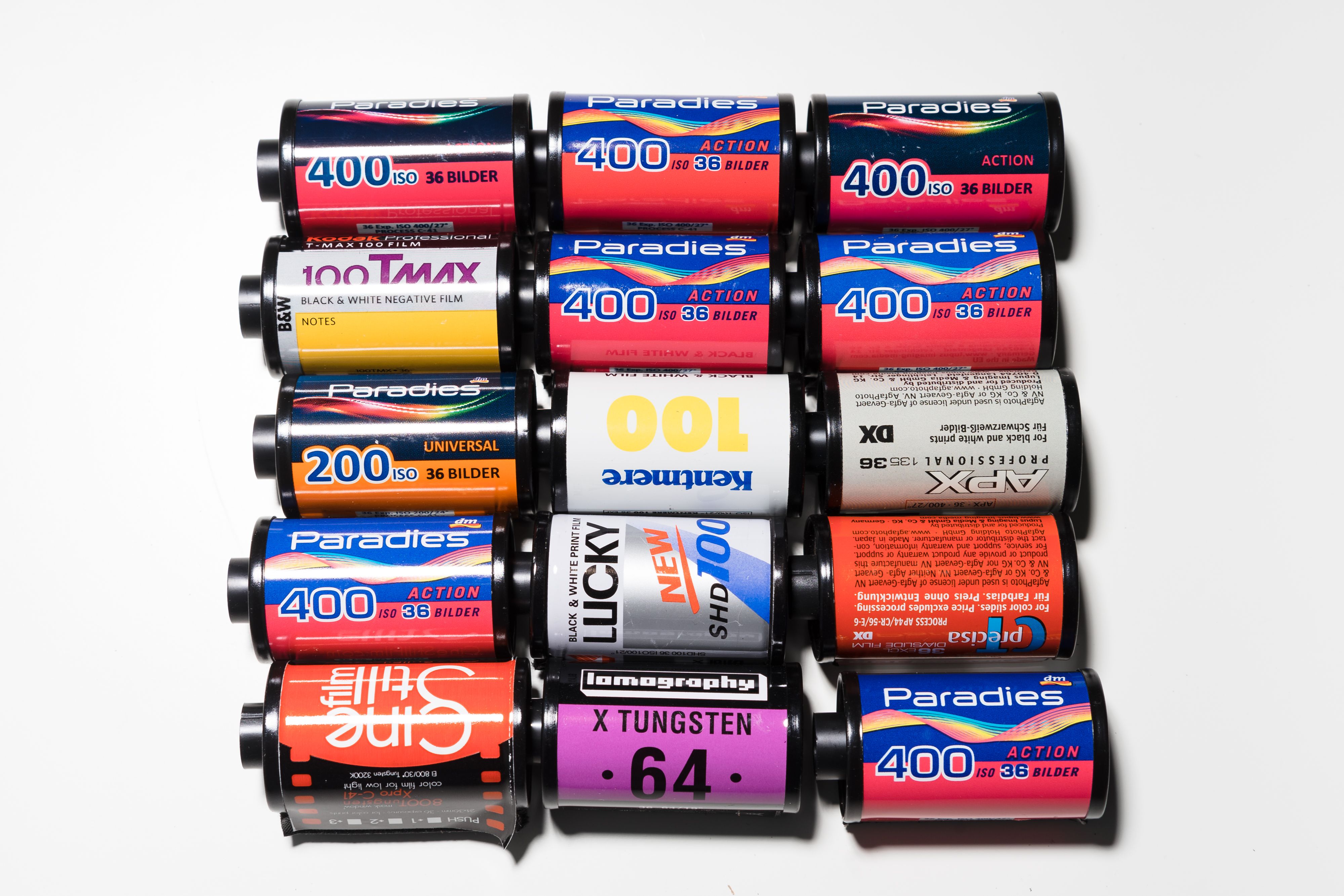 Film Cartridges on White Background · Free Stock Photo