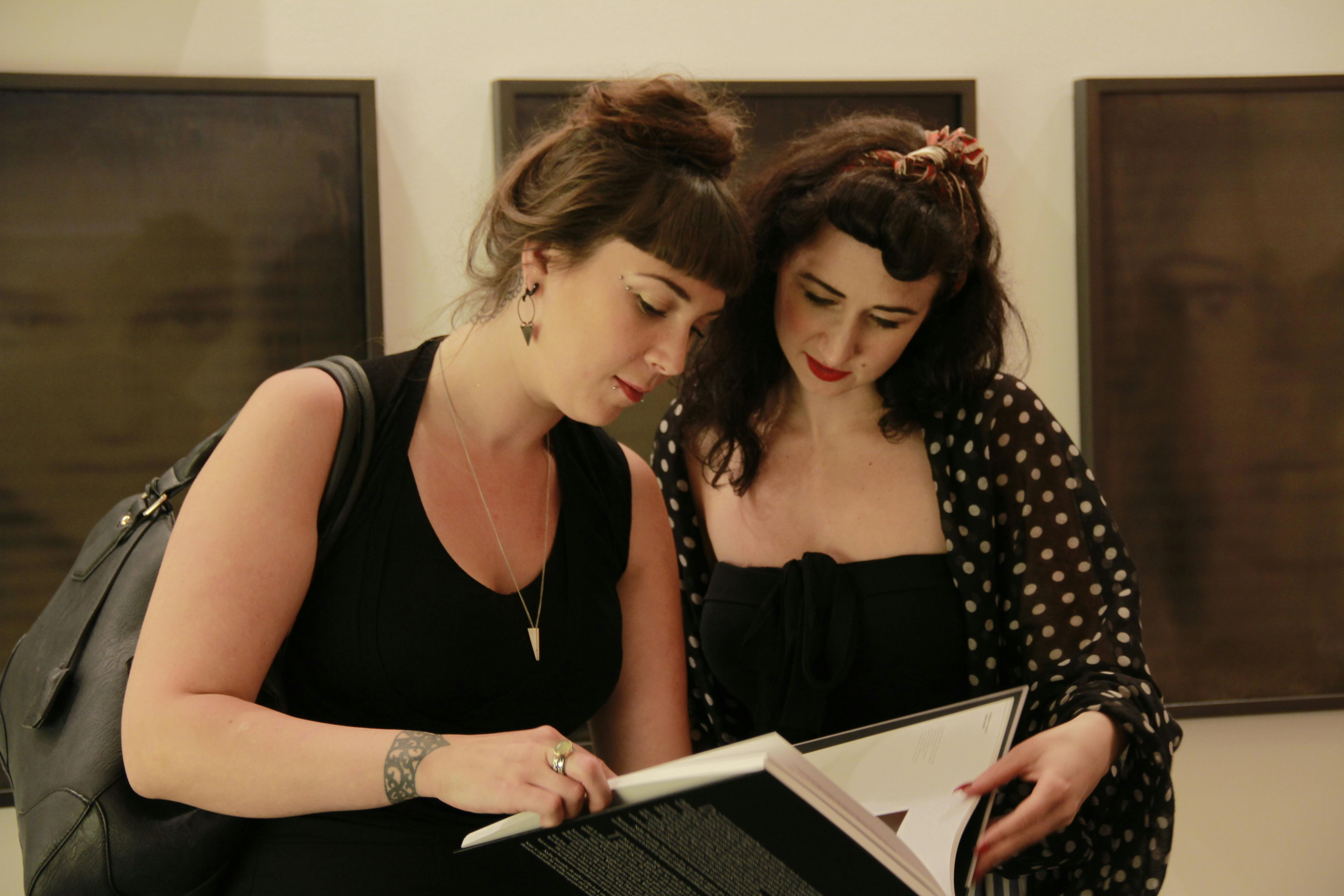 Women Reading a Book · Free Stock Photo