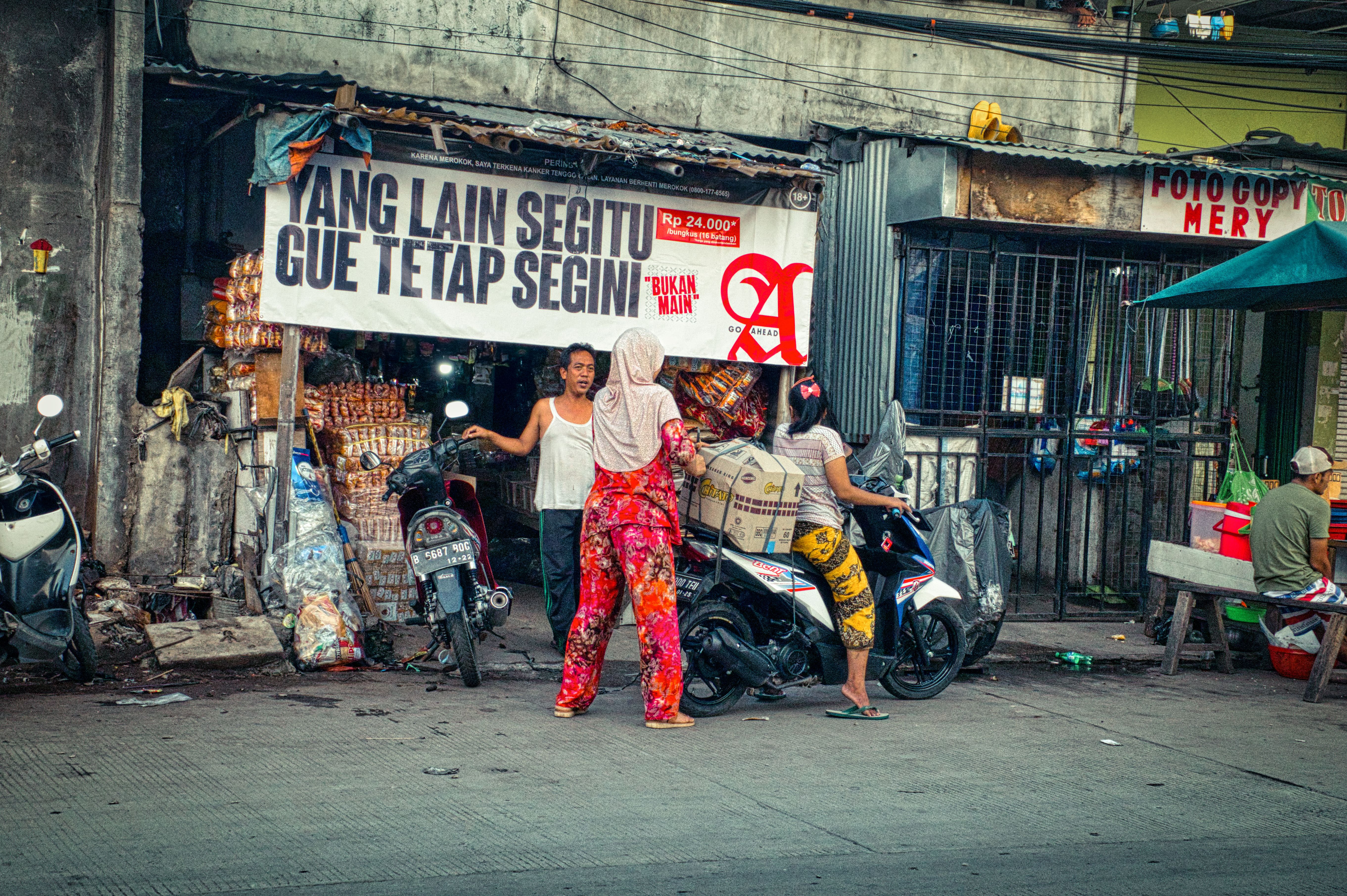 People Having a Conversation in Front of a Small Store · Free Stock Photo