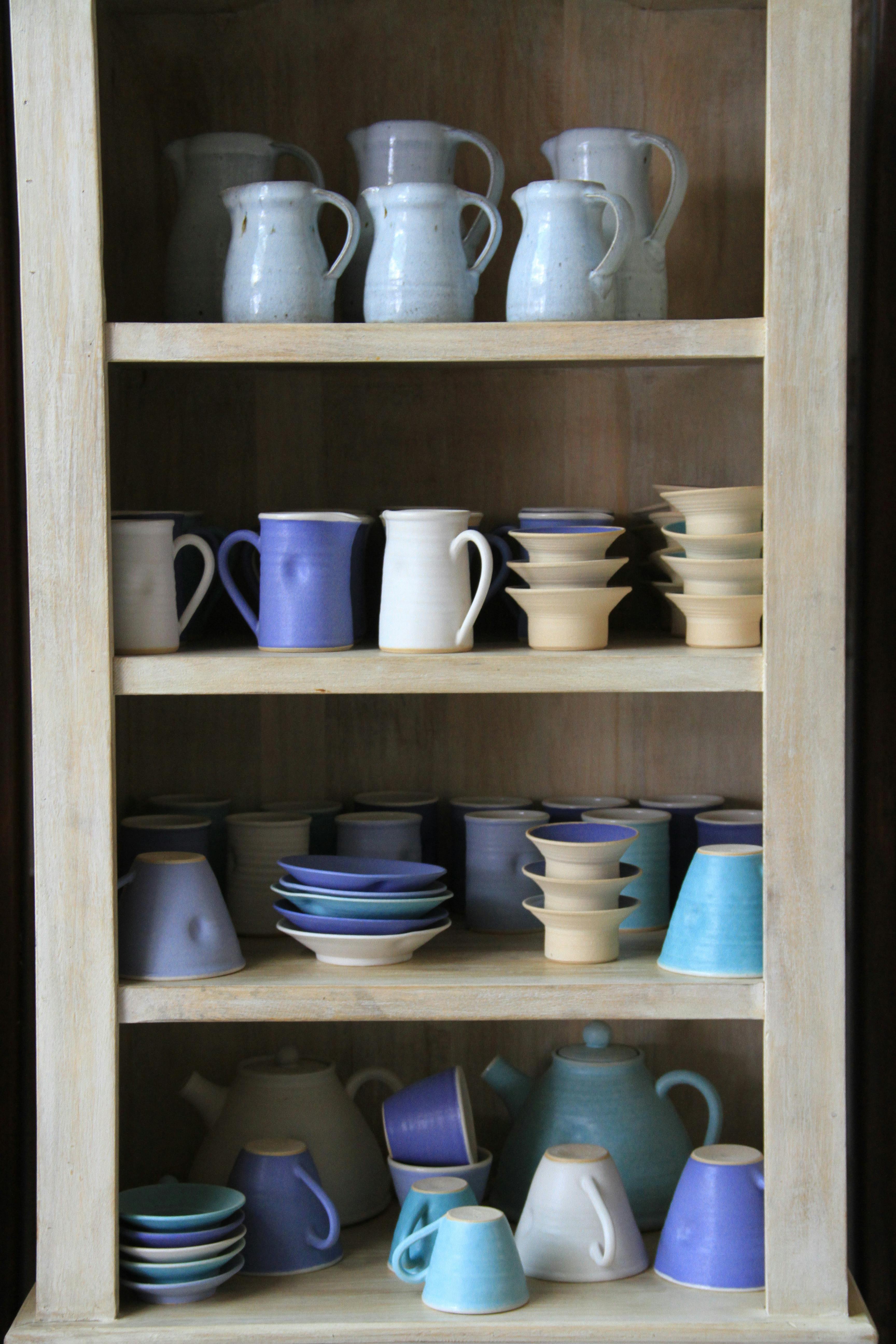 Porcelain Set on Shelves · Free Stock Photo