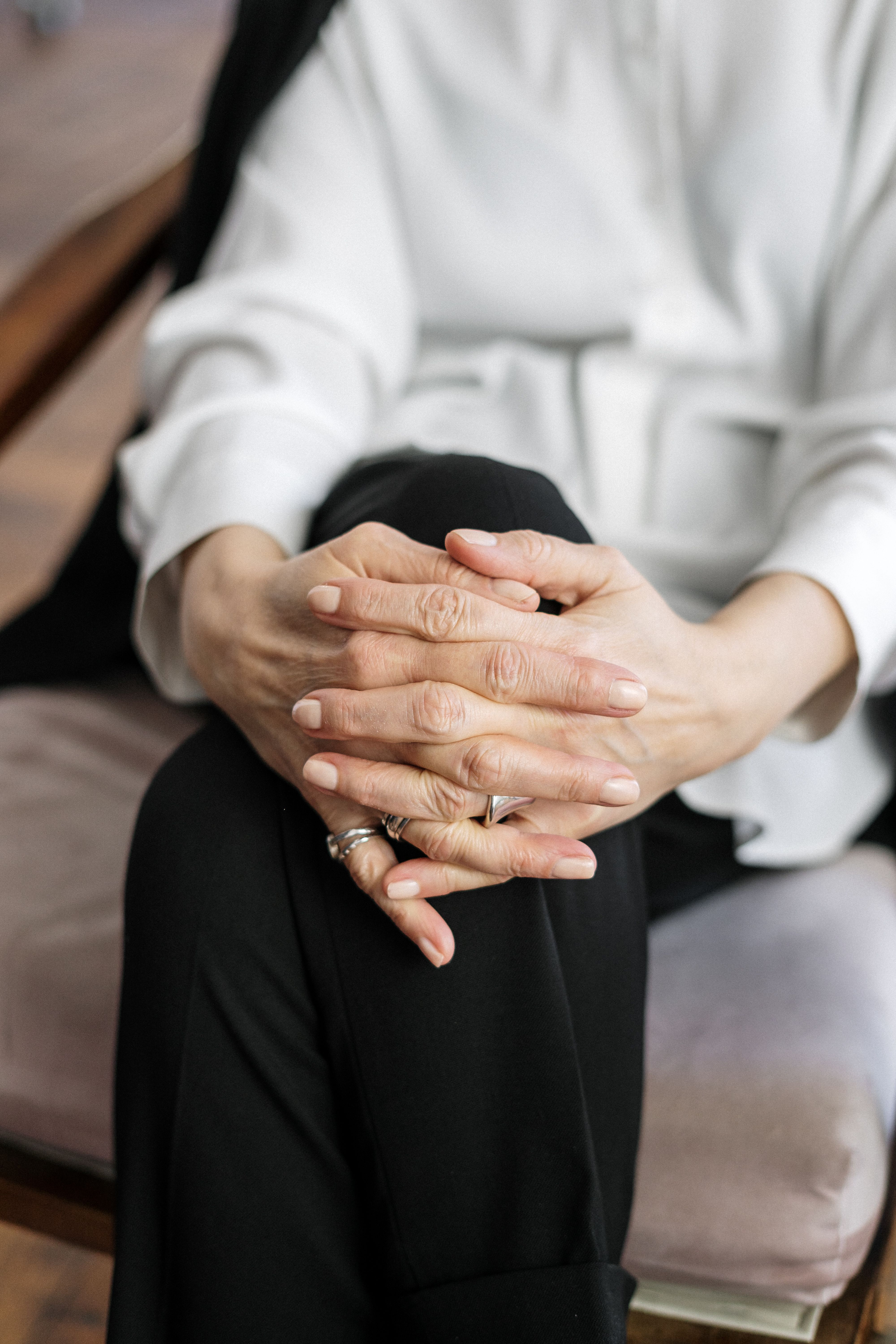 Person Wearing Silver Ring and Gold Ring · Free Stock Photo