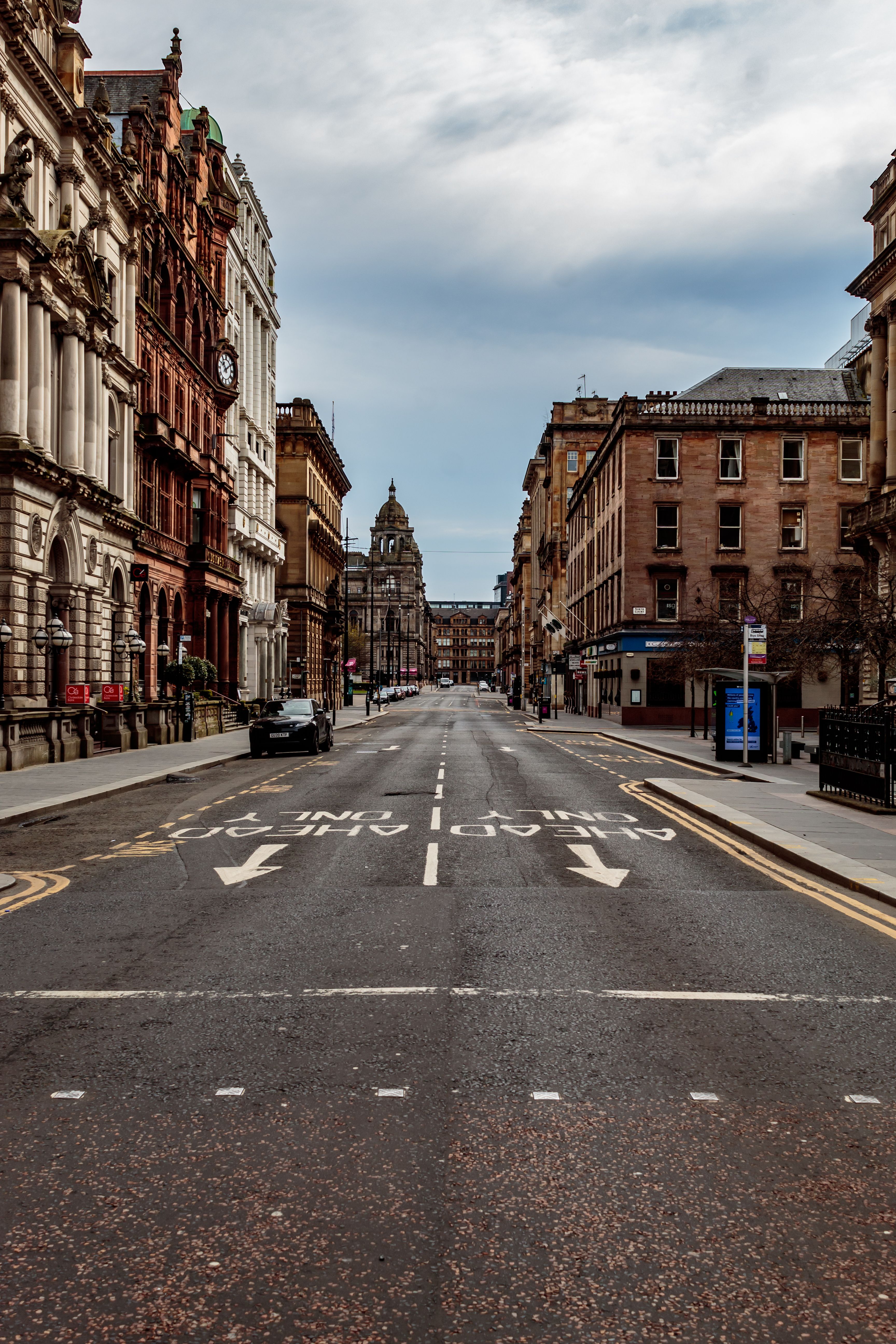 Photo of People Walking on Road Near Buildings · Free Stock Photo