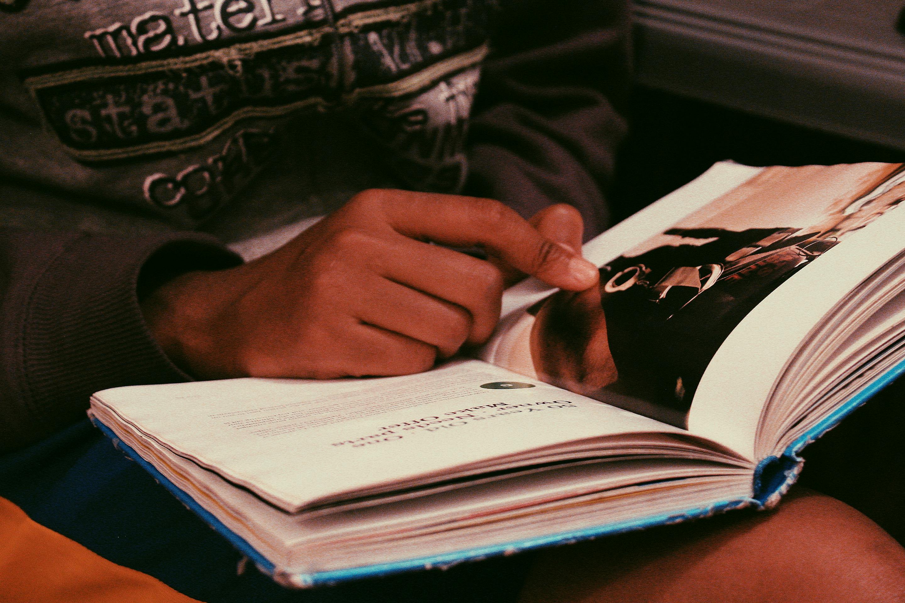 A Person Reading a Book · Free Stock Photo