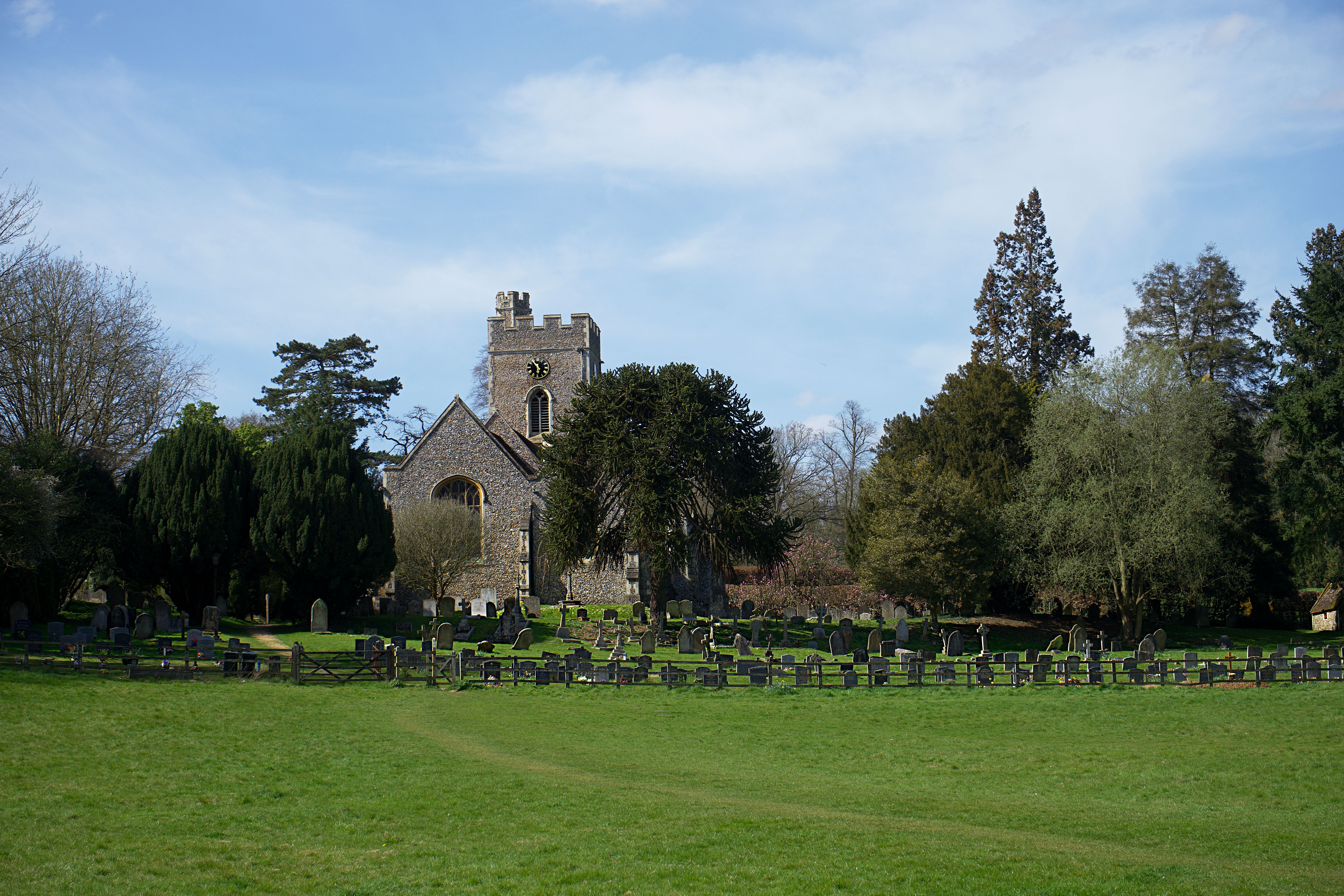 A Church With Graveyard On A Grass Field · Free Stock Photo