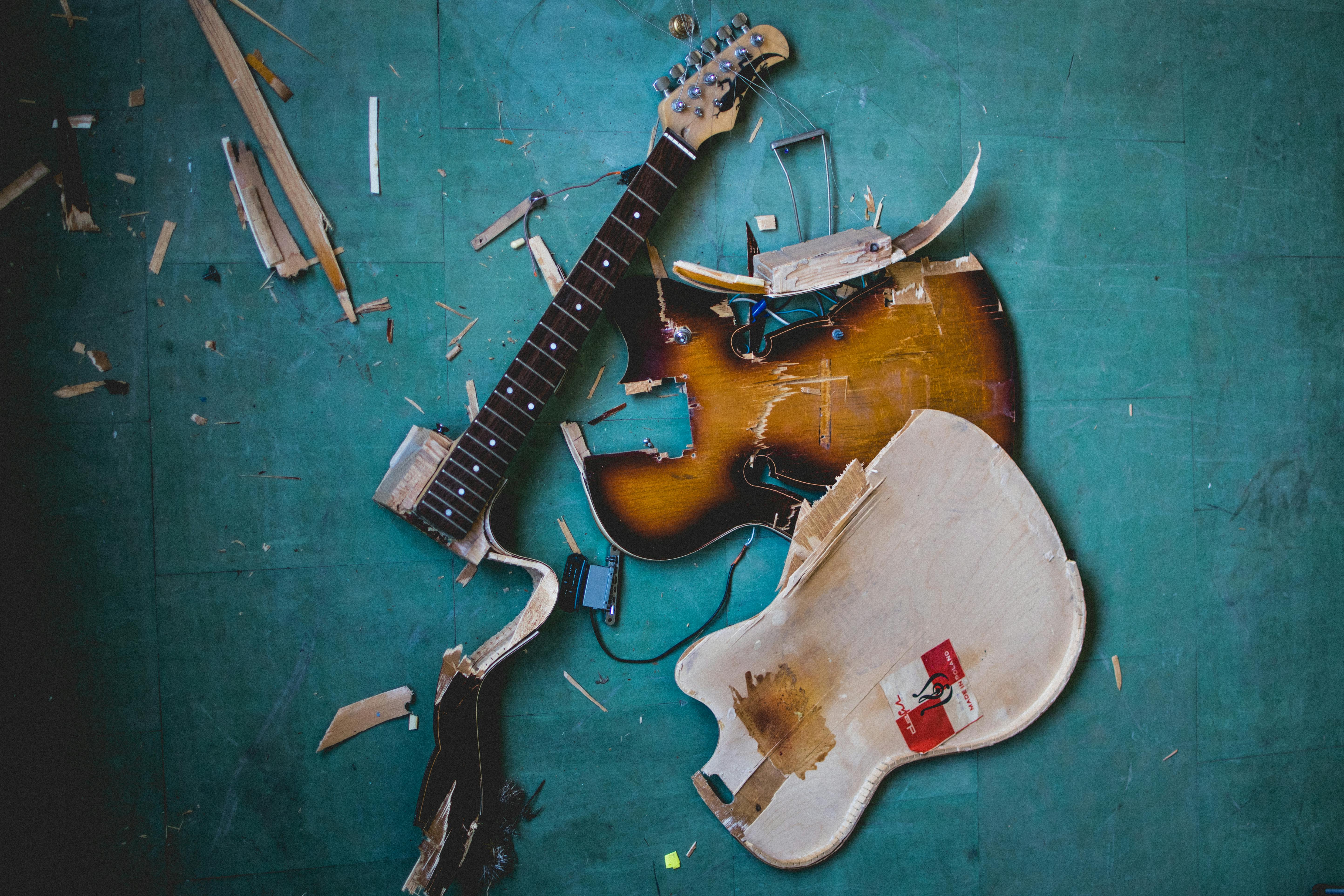 Brown Broken Guitar on the Floor · Free Stock Photo