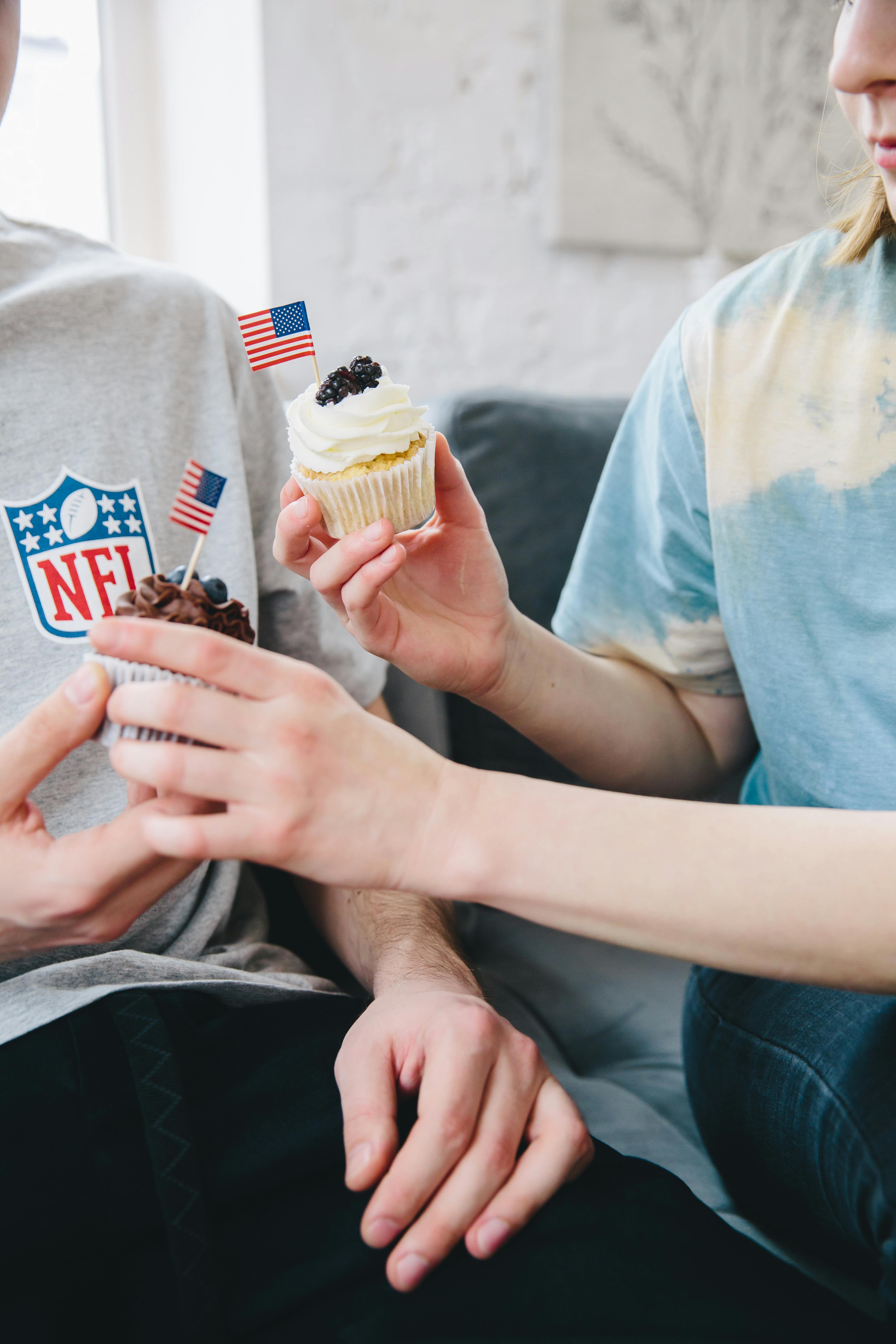 People with Cupcakes with Flags of USA · Free Stock Photo