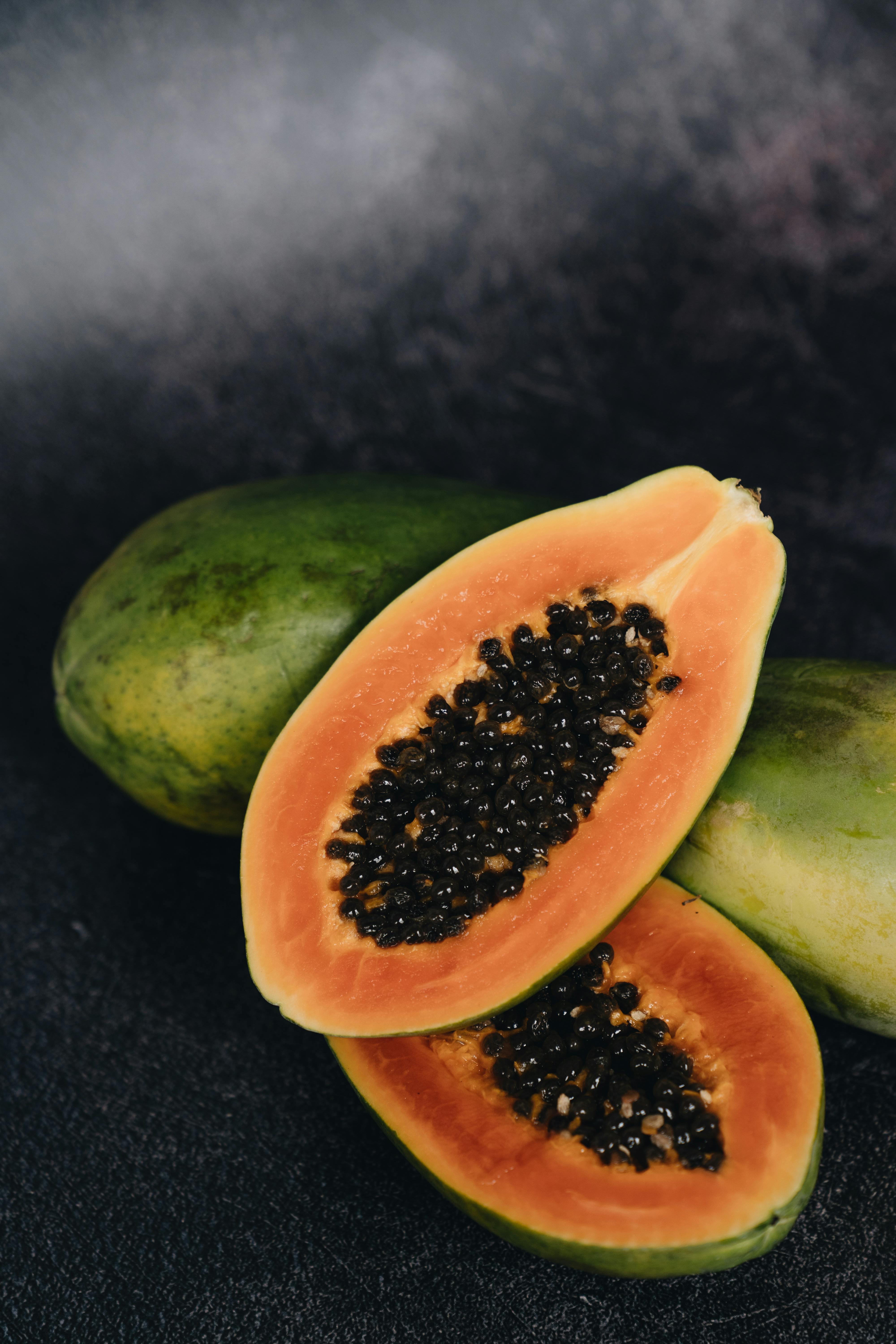 Close-Up Photo Of Sliced Papaya · Free Stock Photo